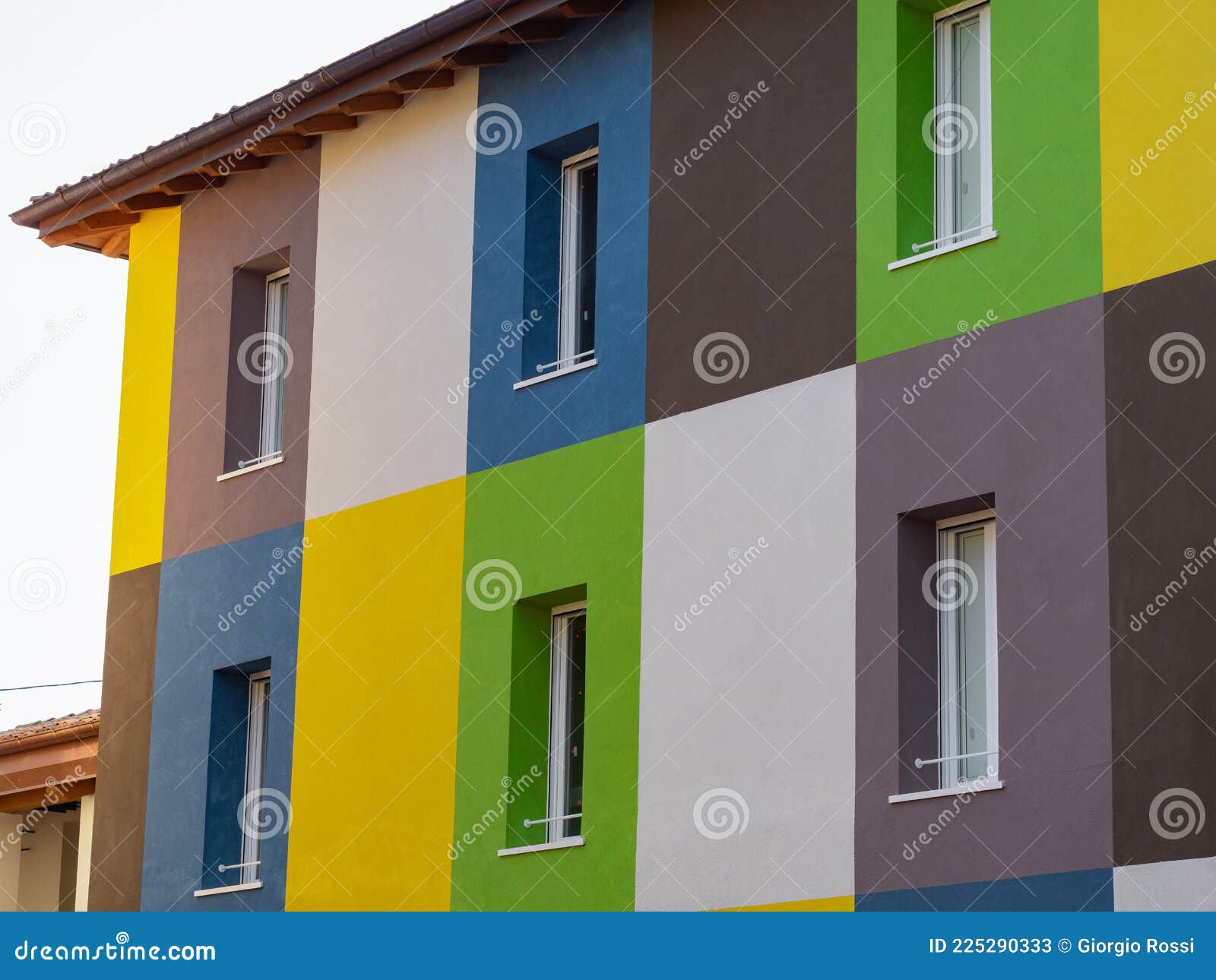 Facade of a House Divided into Rectangular Spaces Colored Different ...
