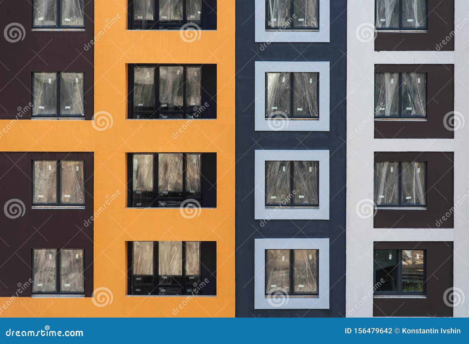 Facade of the House Under Construction with Multi-colored Decorative ...