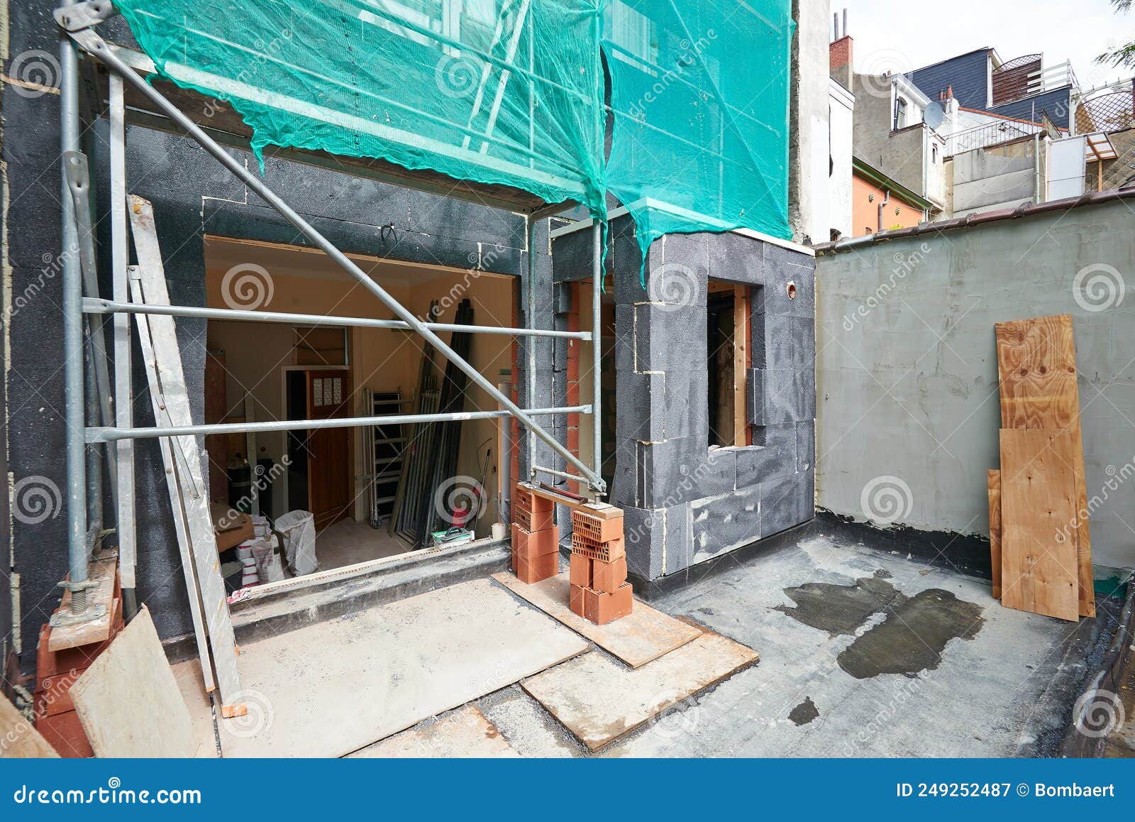 Facade Insulation with Protected Scaffolding Stock Image - Image of ...