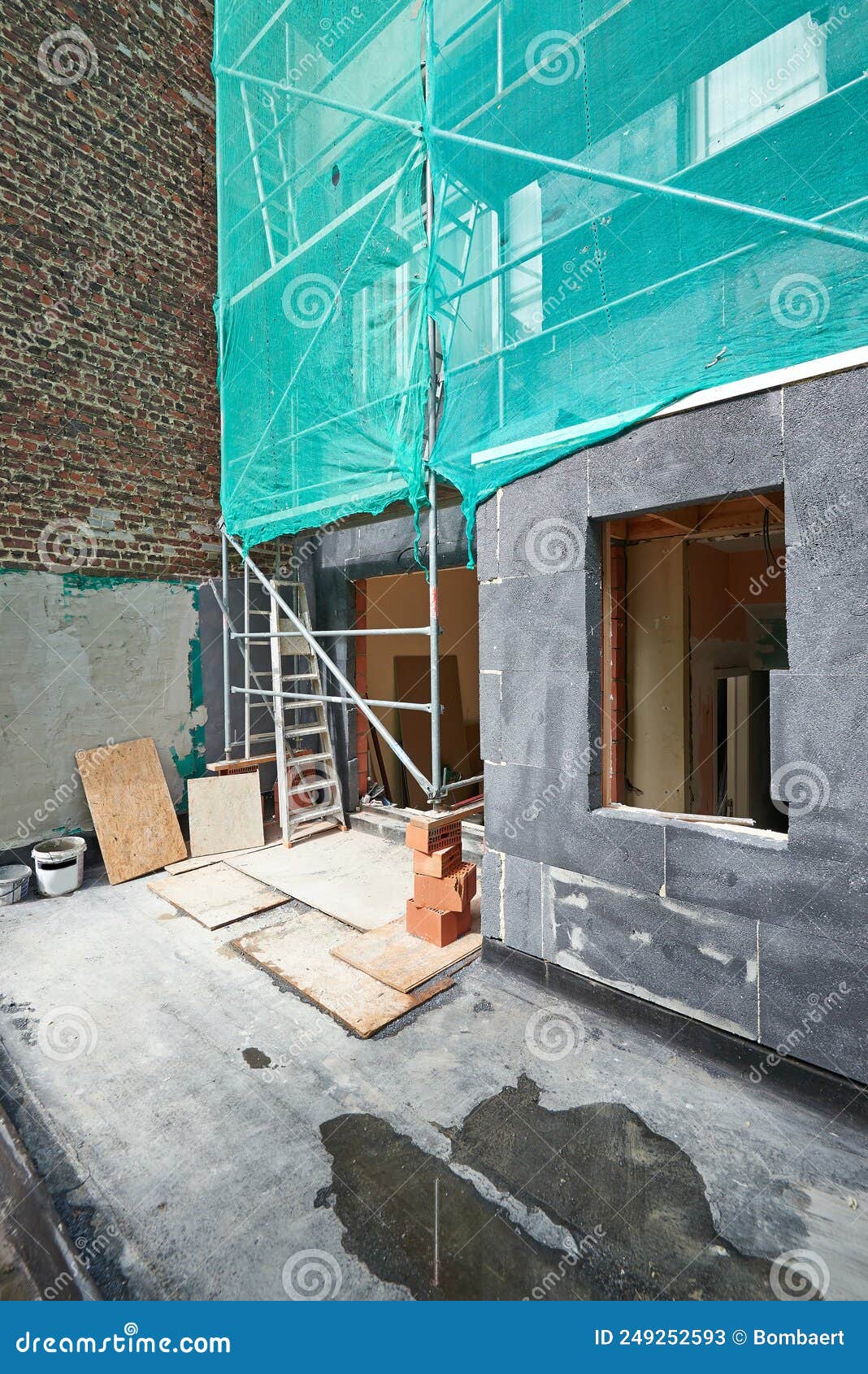 Facade Insulation with Protected Scaffolding Stock Image - Image of ...
