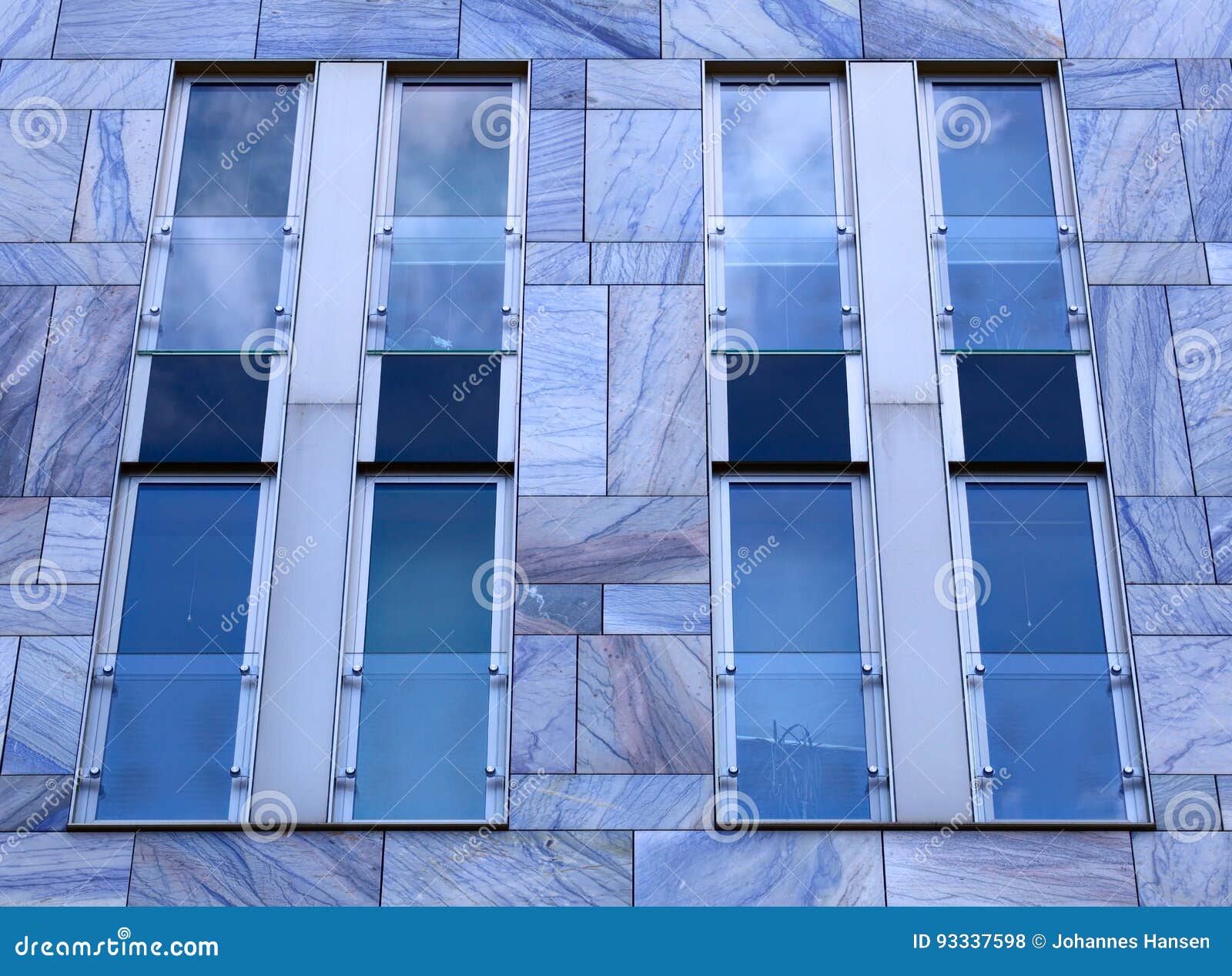 Facade of Modern Building with Blue Marble Tiles and Panes Stock Photo ...