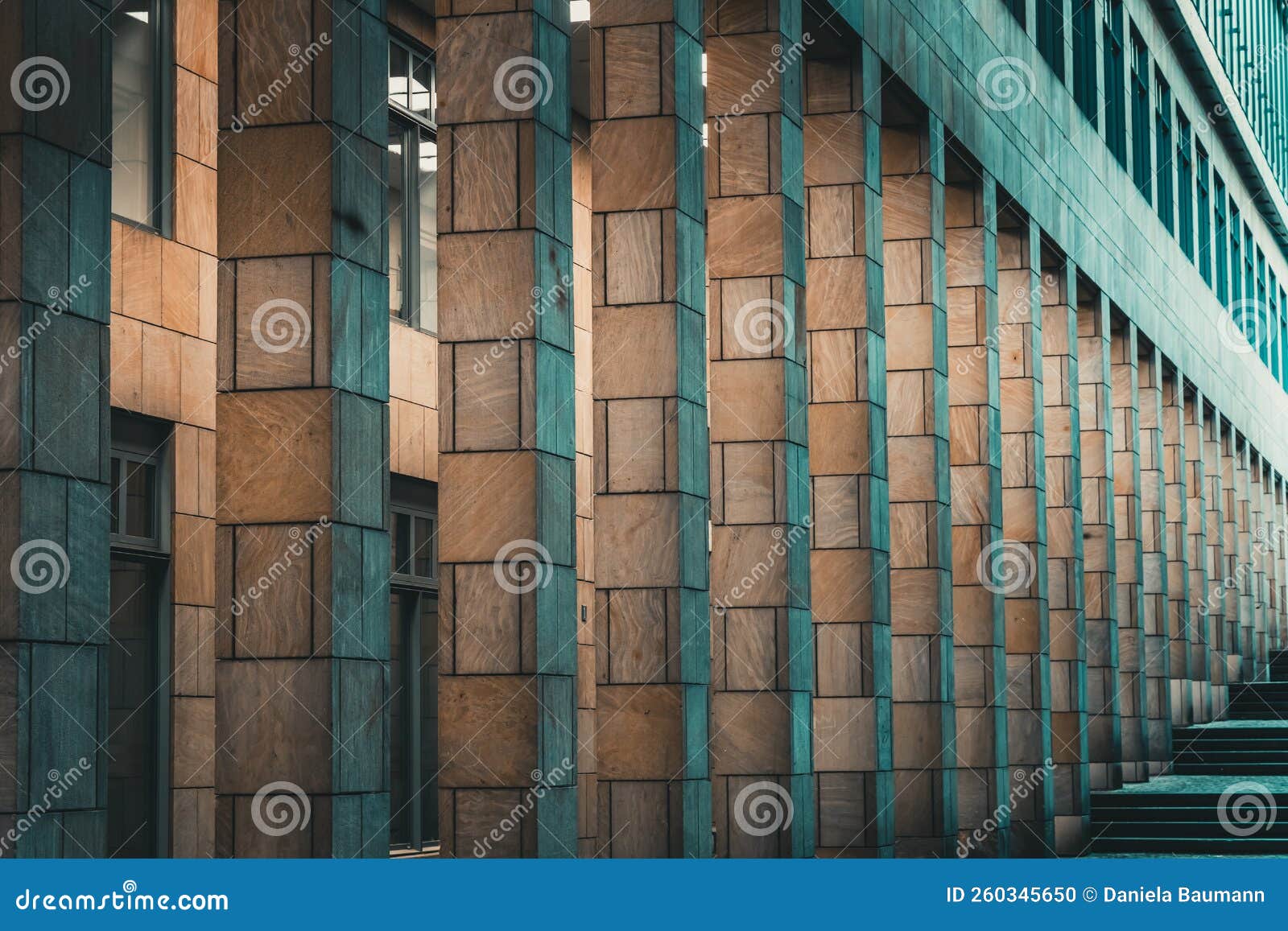 Facade of a Modern Building with Columns in Golden Evening Light Stock ...