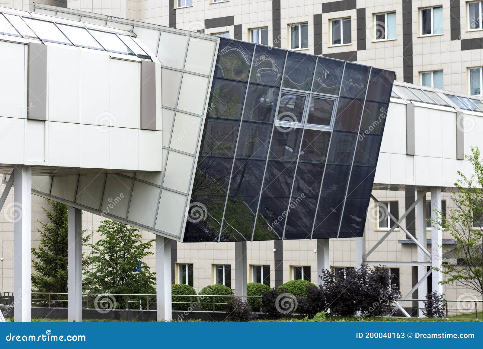 The Facade of a Modern Building with a Glazed Passage between the ...
