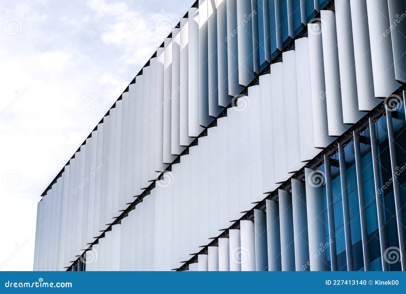 The Facade of a Modern Building with an Innovative Facade Made of ...