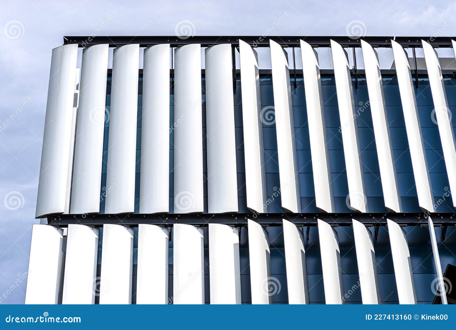 The Facade of a Modern Building with an Innovative Facade Made of ...