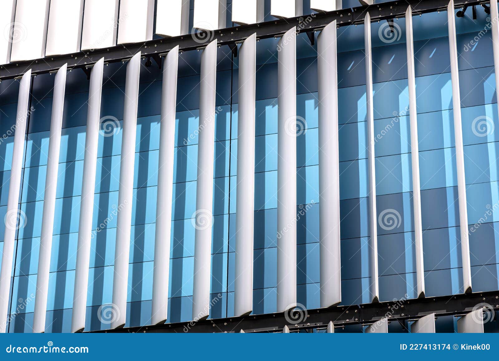 The Facade of a Modern Building with an Innovative Facade Made of ...