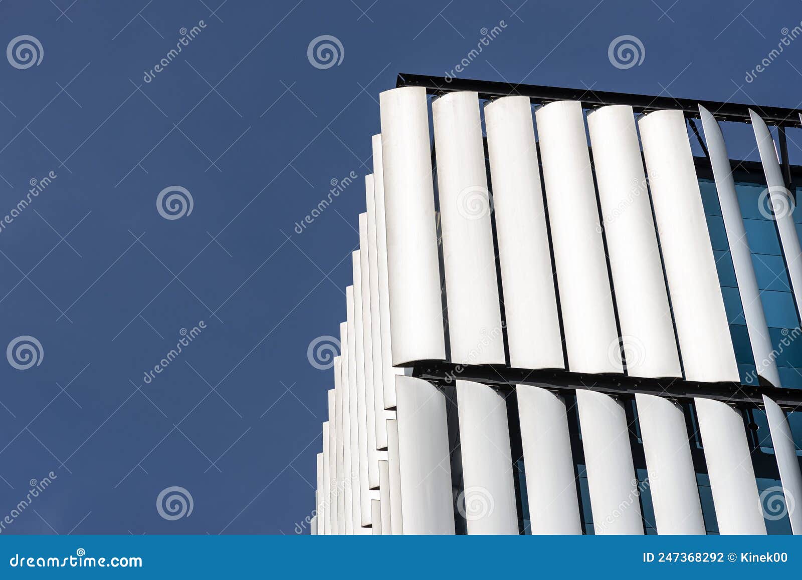 The Facade of a Modern Building with an Innovative Facade Made of ...