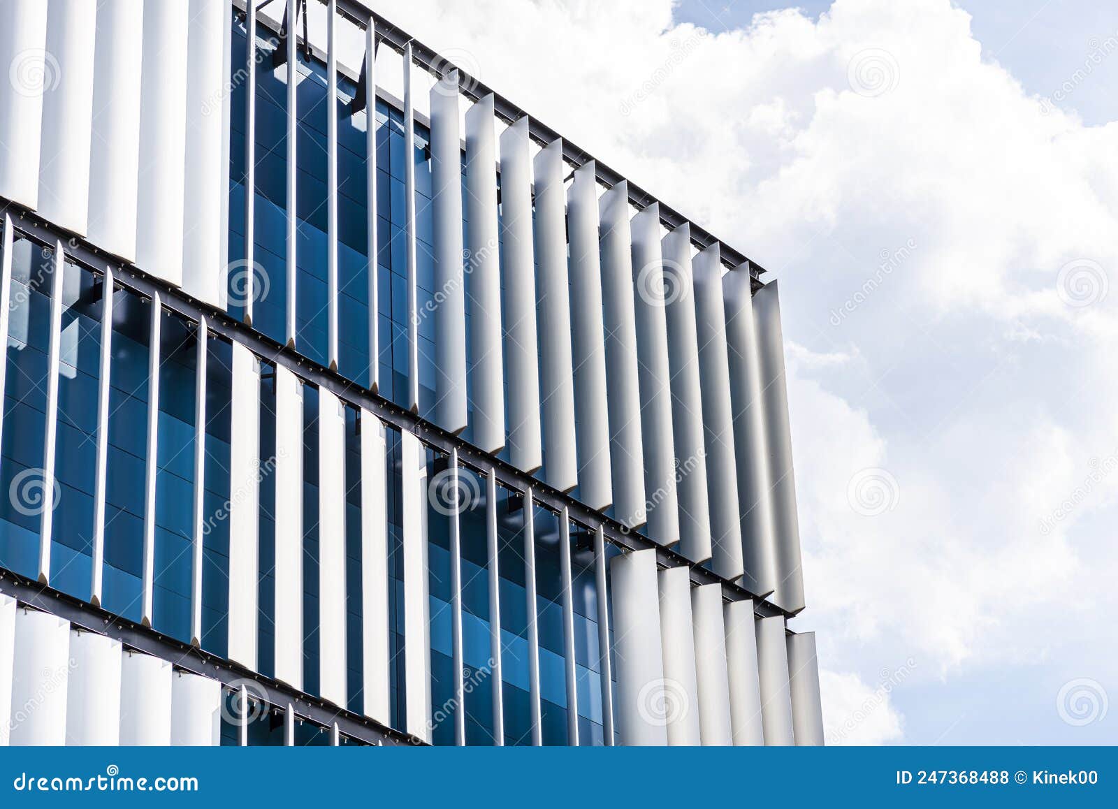 The Facade of a Modern Building with an Innovative Facade Made of ...