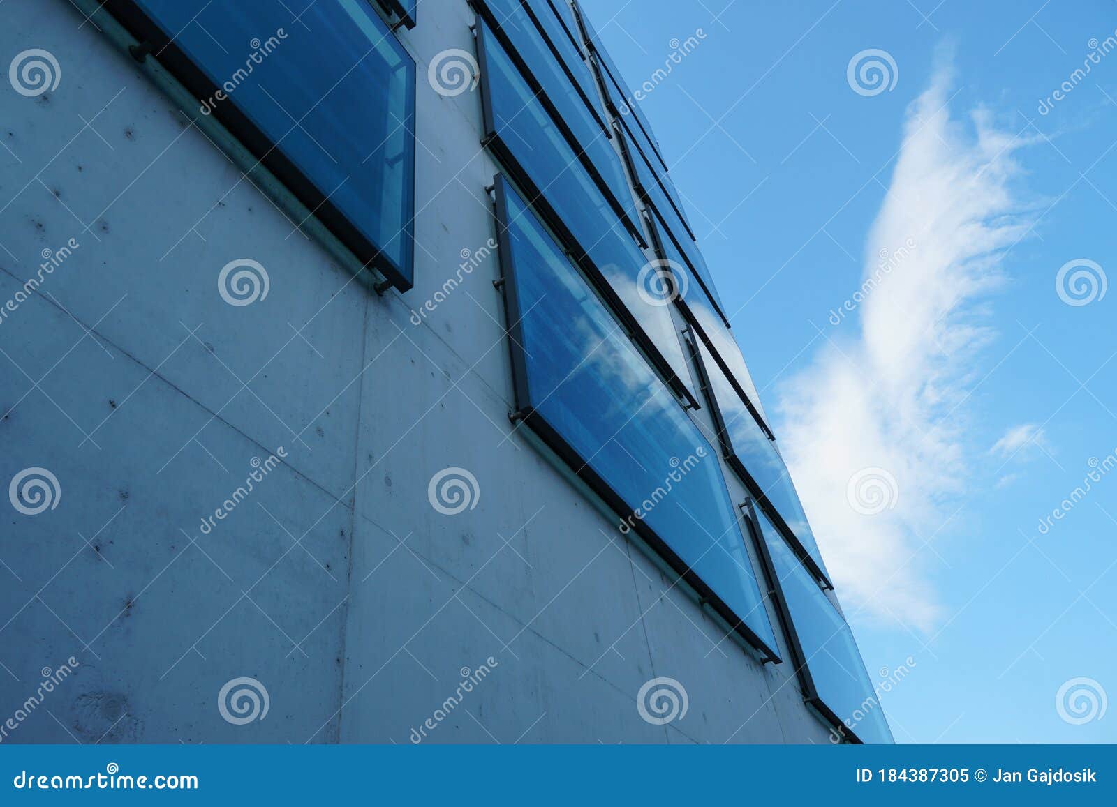 A Facade of a Modern Corporate Building with Large Square Window in ...