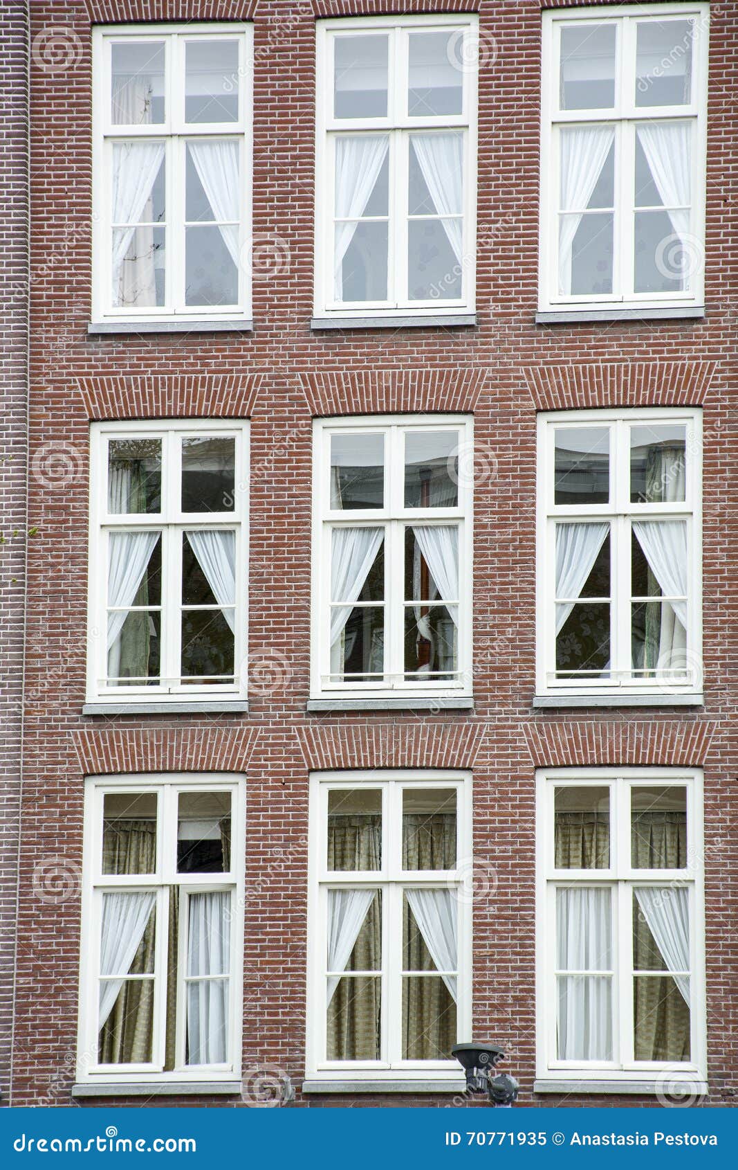 Facade of the Modern European House with Nine Windows and Blinds Stock ...