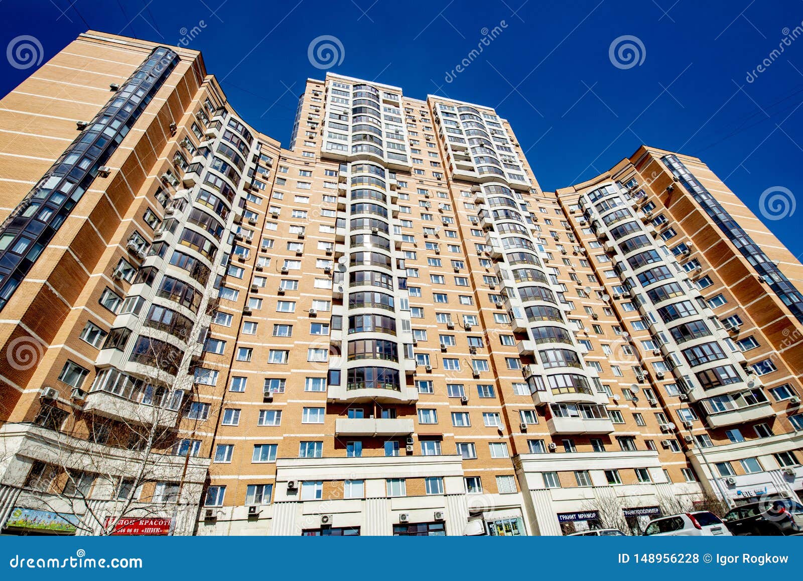 The Facade of a Modern Multi-storey High-rise Building with Windows in ...