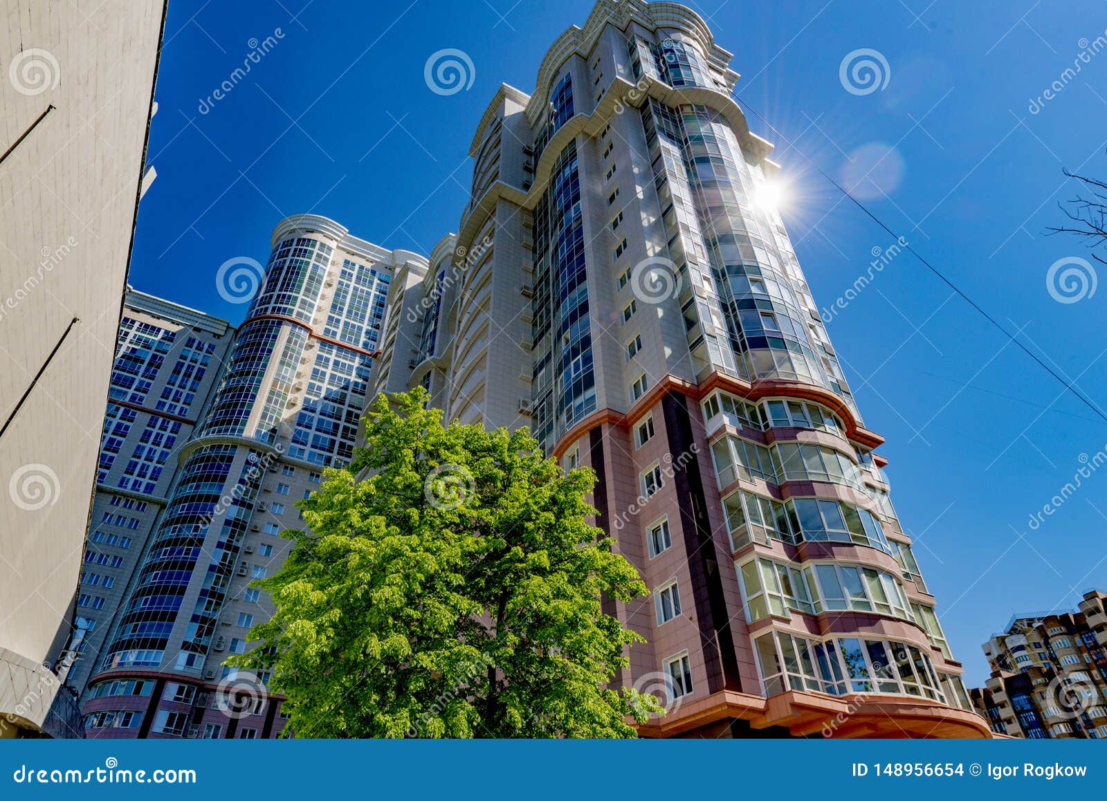 The Facade of a Modern Multi-storey High-rise Building with Windows in ...