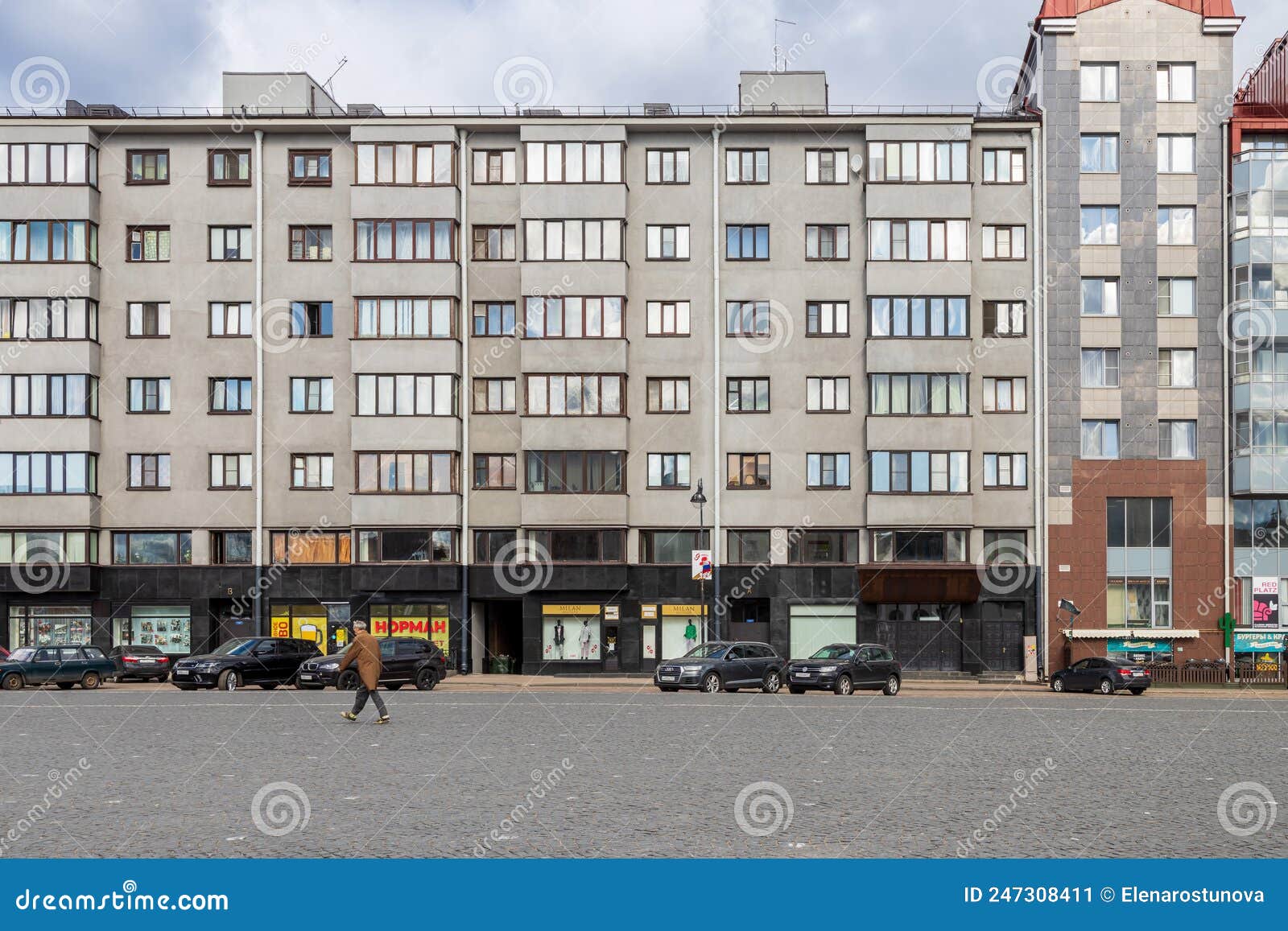 Facade of an Modern Seven-story Building with Windows and Cellular ...