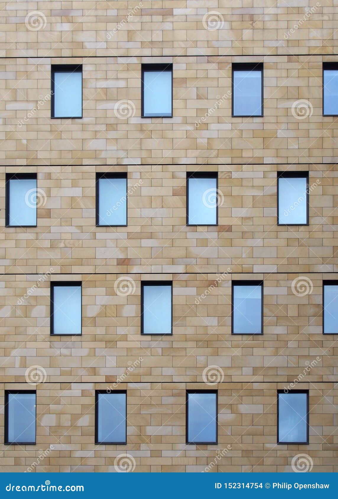 Facade of a Modern Stone Building with Geometric Repeating Pattern of ...