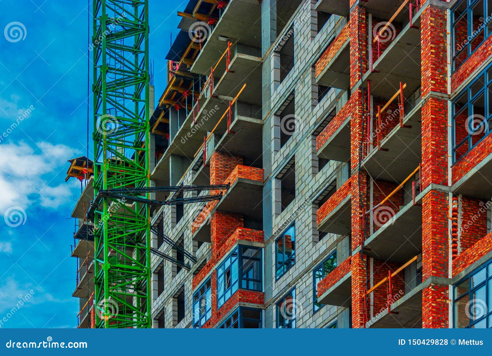 Facade of New Apartment Building with Crane Part Stock Photo - Image of ...