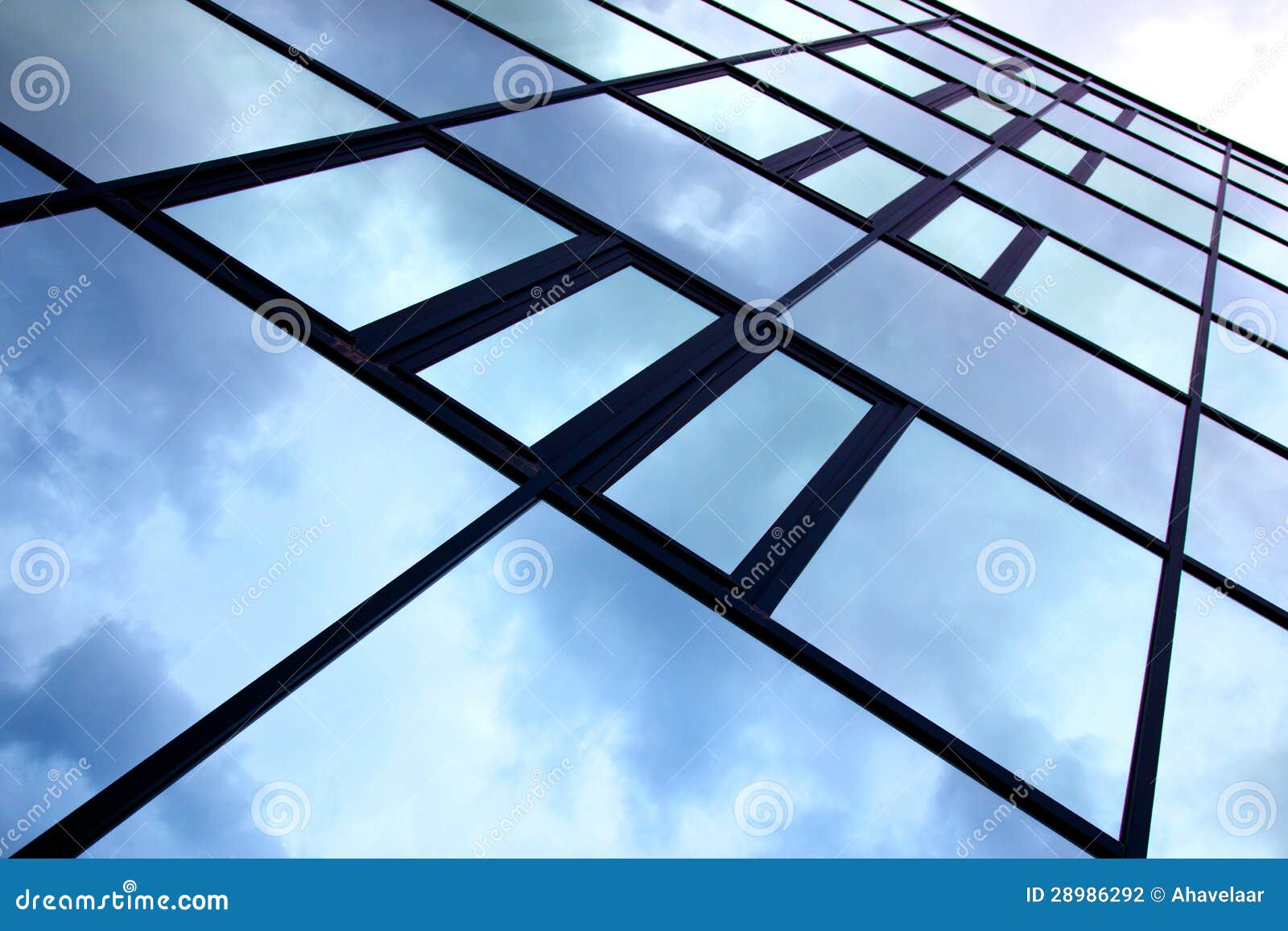 Facade of Office Building with Overcast Sky Reflected Stock Photo ...
