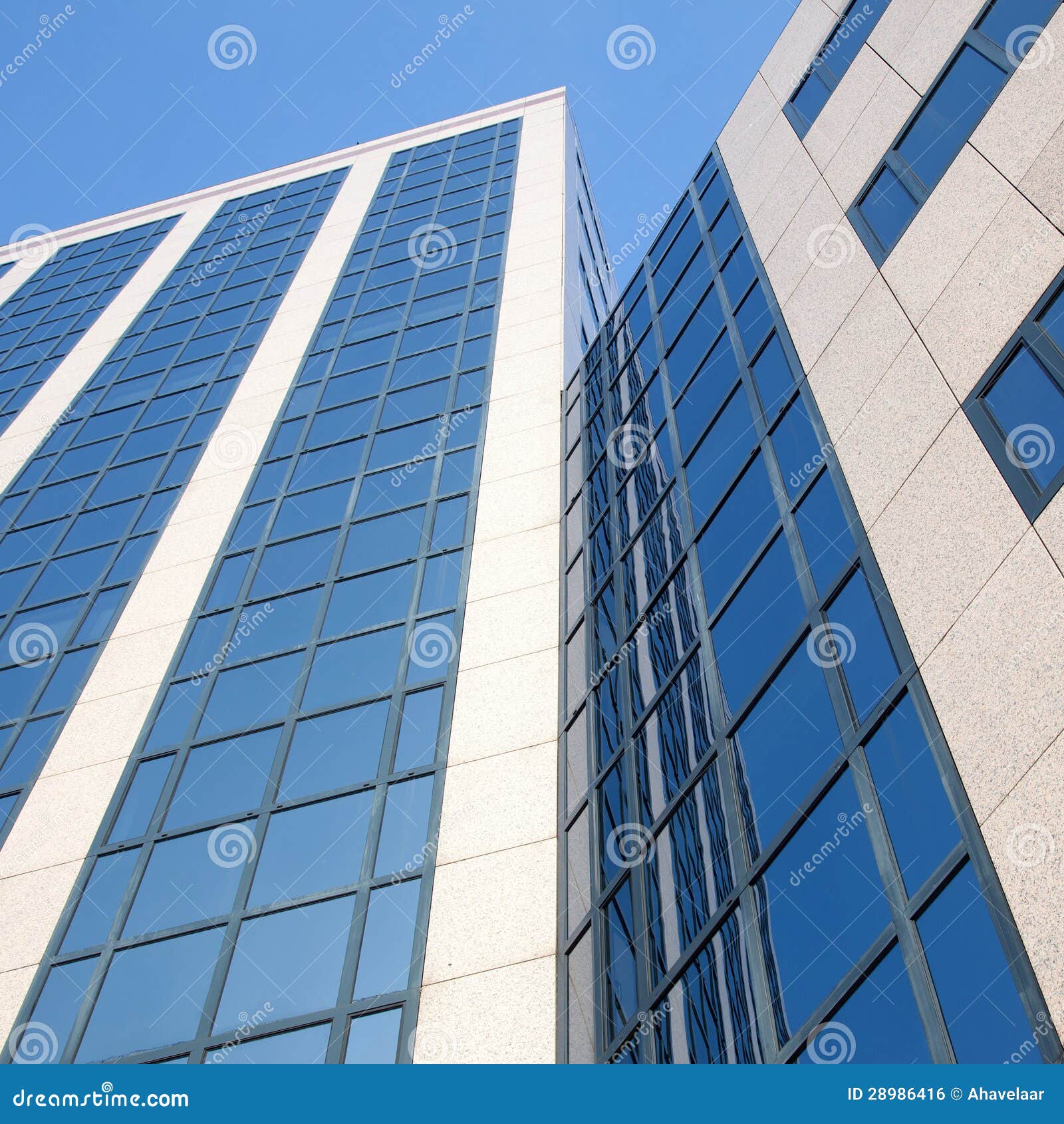 Facade of Office Building with Overcast Sky Reflected Stock Photo ...