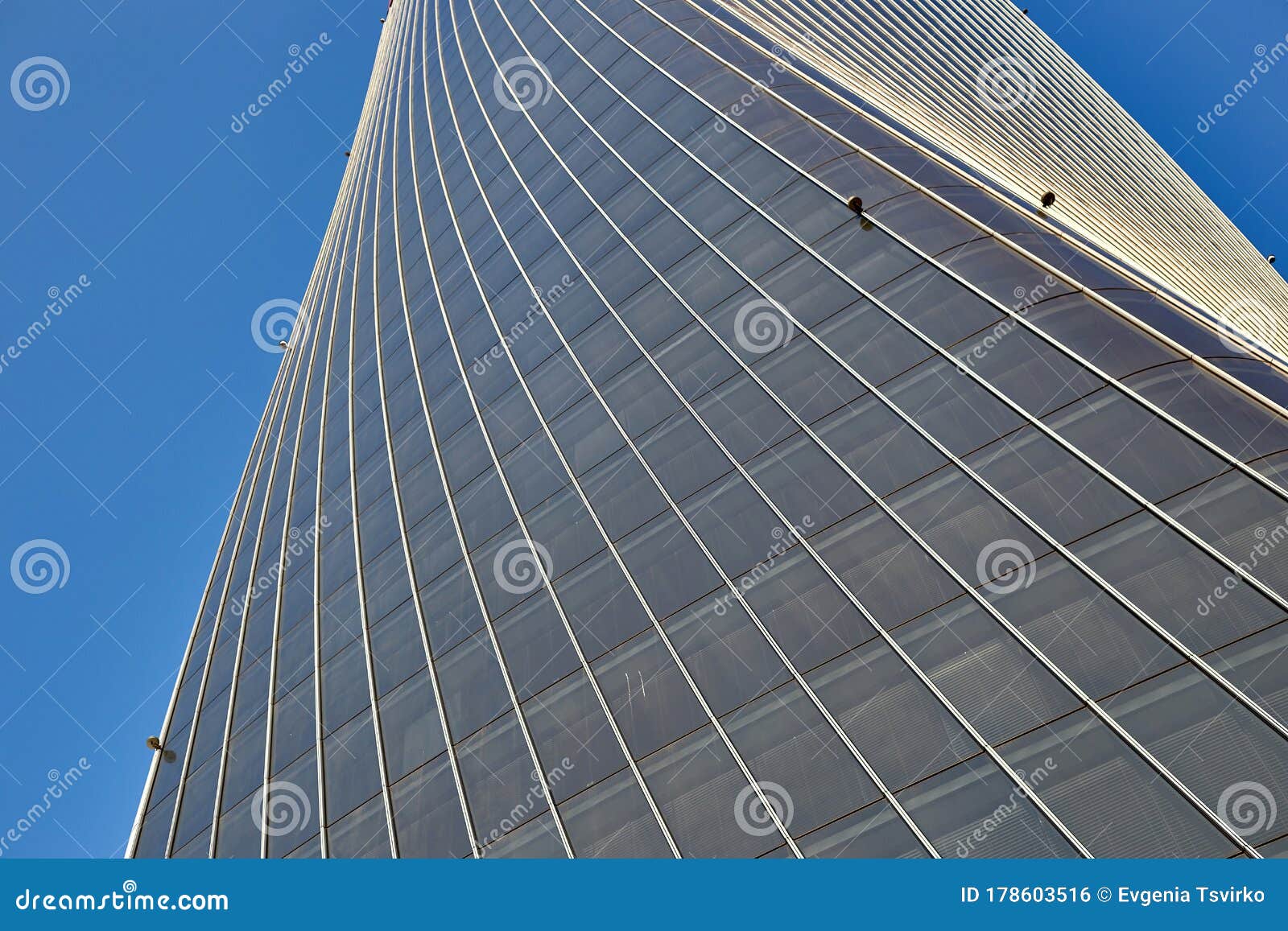 Facade of an Office High-rise Curved Building. There are Small Black ...