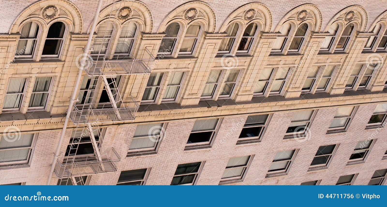 Facade of the Old Brick Building with Decorative Arched Windows Stock ...
