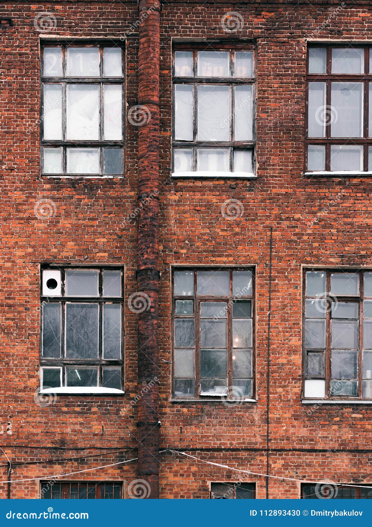 Facade of an Old Brick Building in Loft Style. High Windows and ...