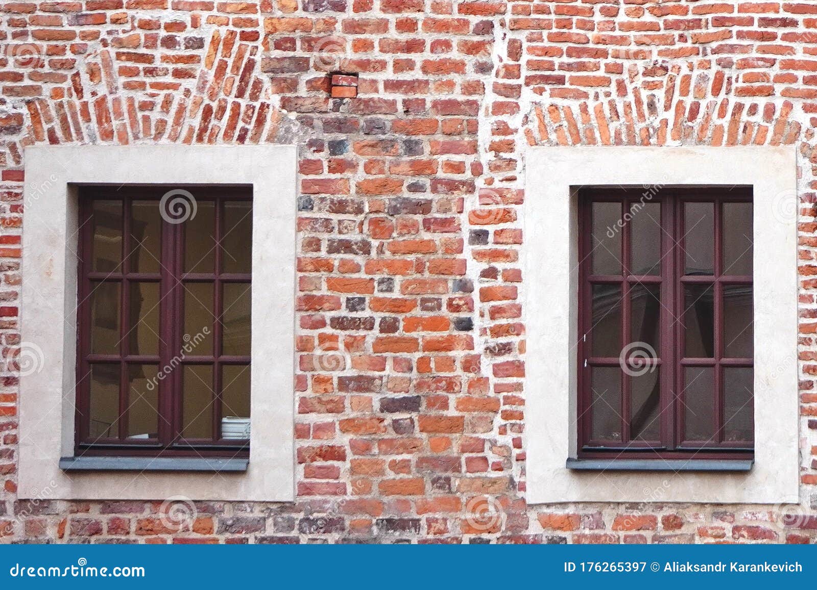 The Facade of an Old Brick Building with Windows or Cornices. Old Brick ...