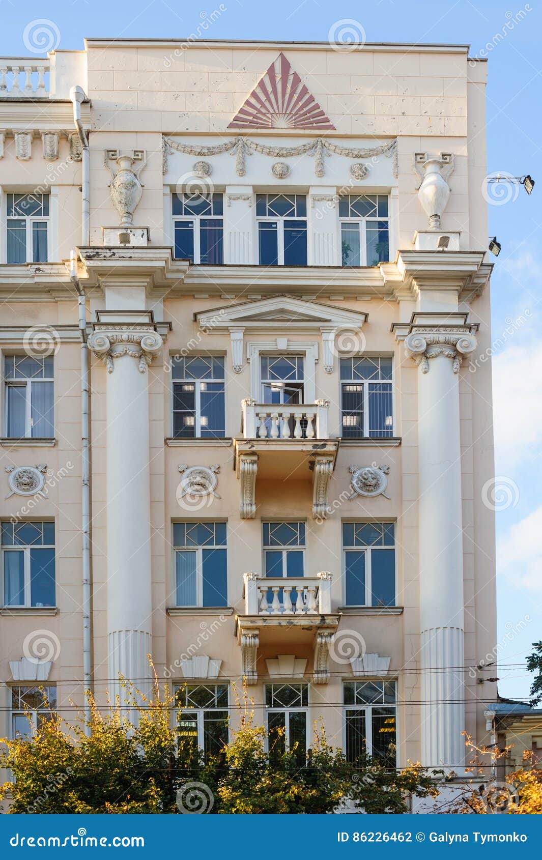 Facade of an Old Building with White Columns and Balconies Stock Photo ...