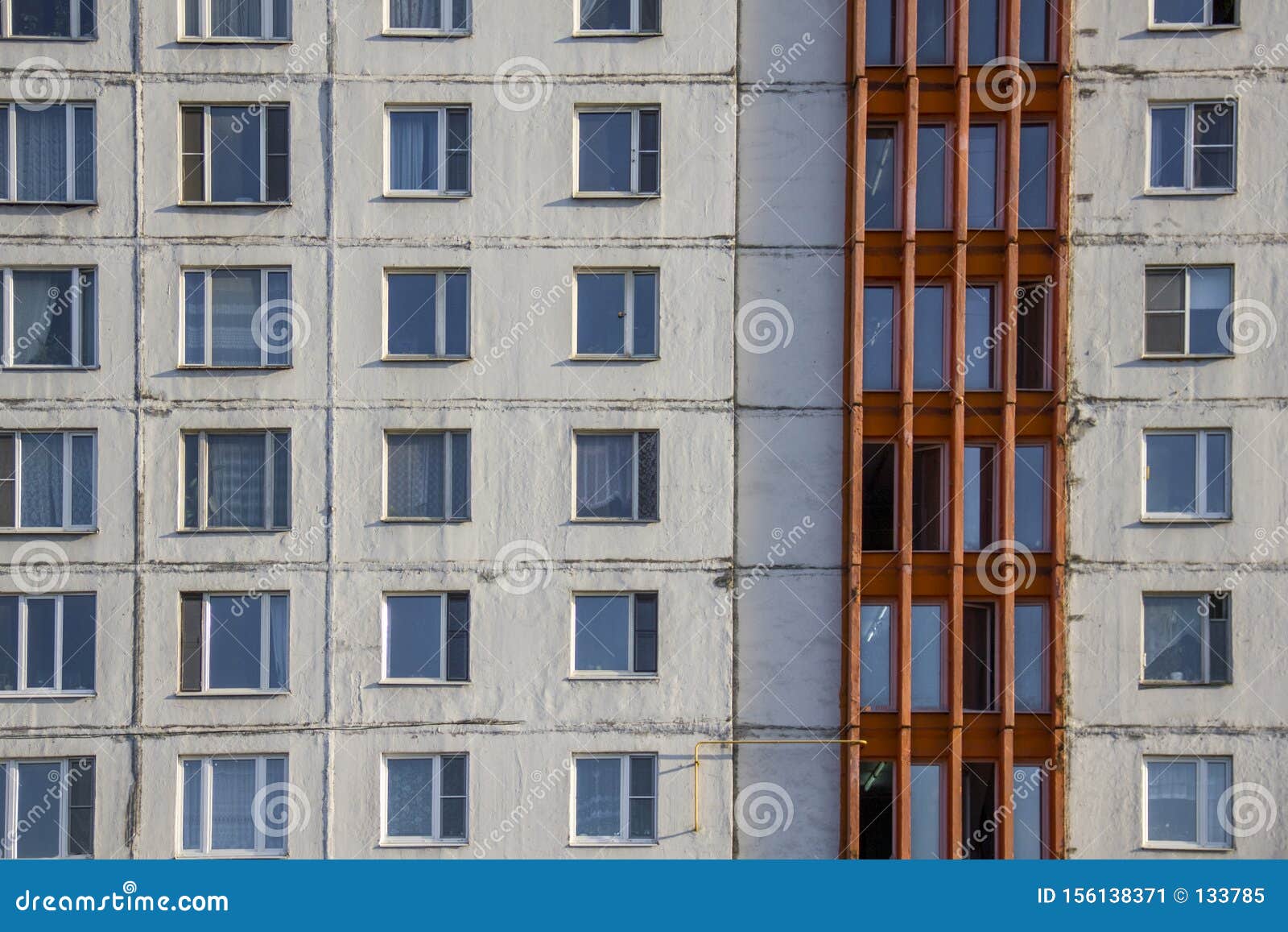 Facade of an Old Shabby High-rise Building with Square Windows Stock ...