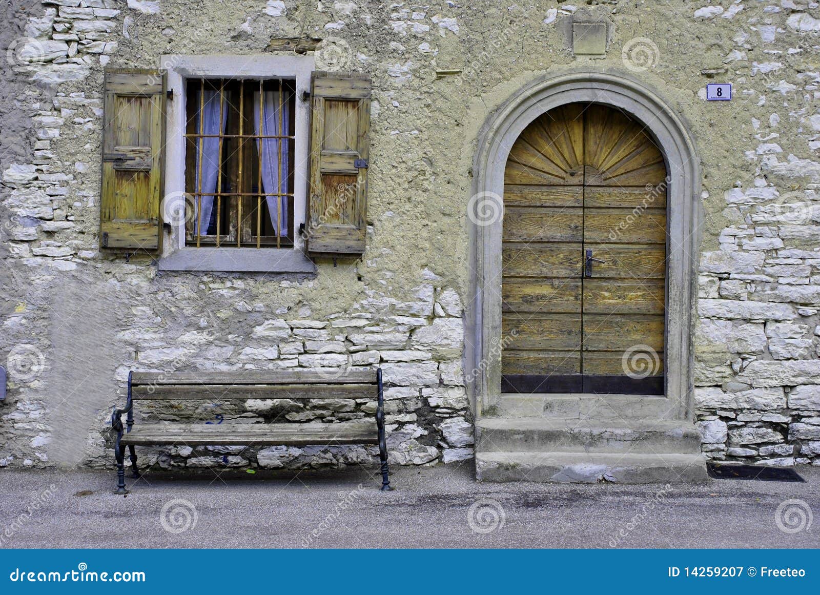 Facade Of A Rustic Bungalow House With Stone Walls Stock Photography ...