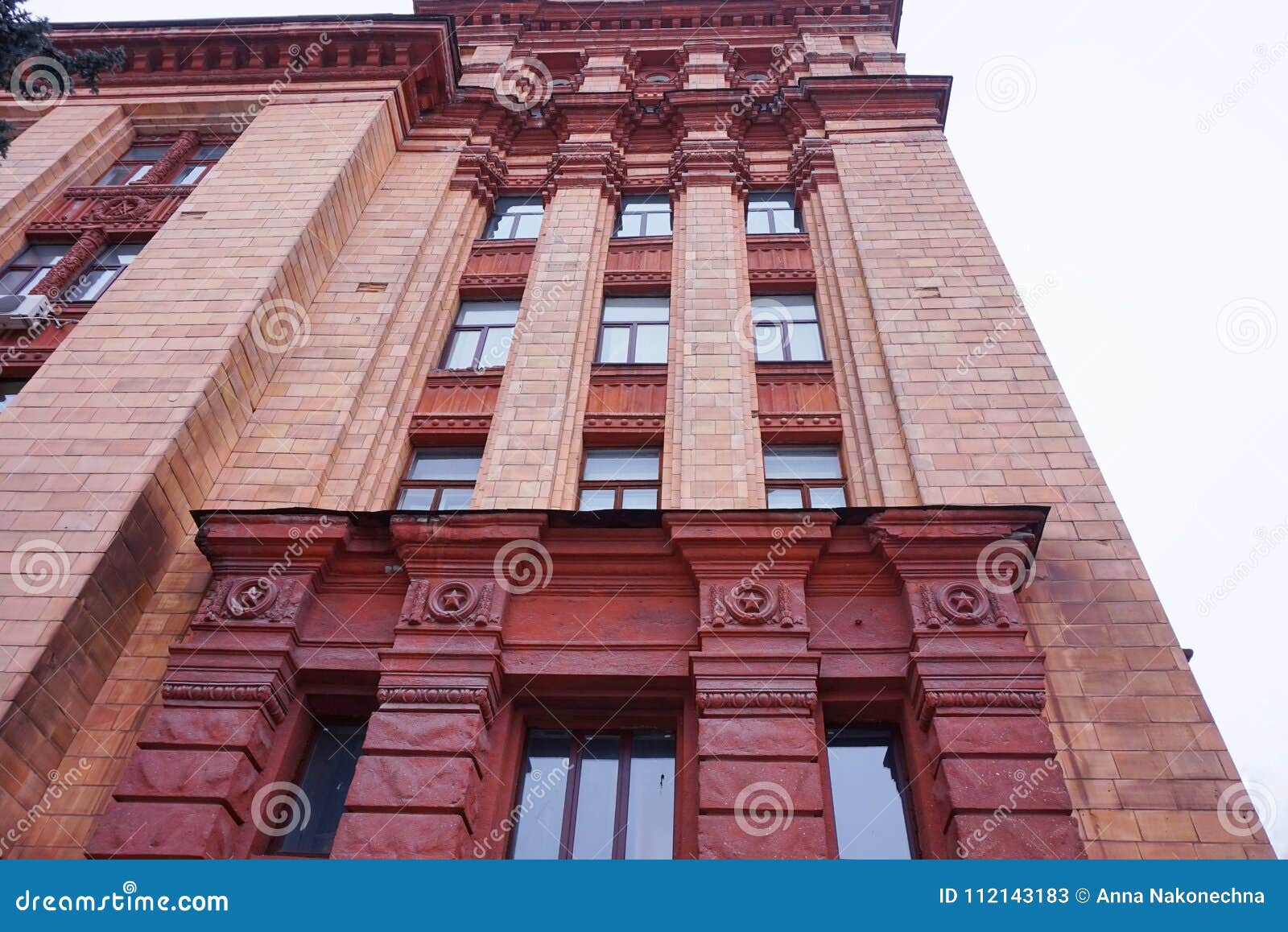 The Facade of a Tall Red Brick Building. Stock Image - Image of culture ...