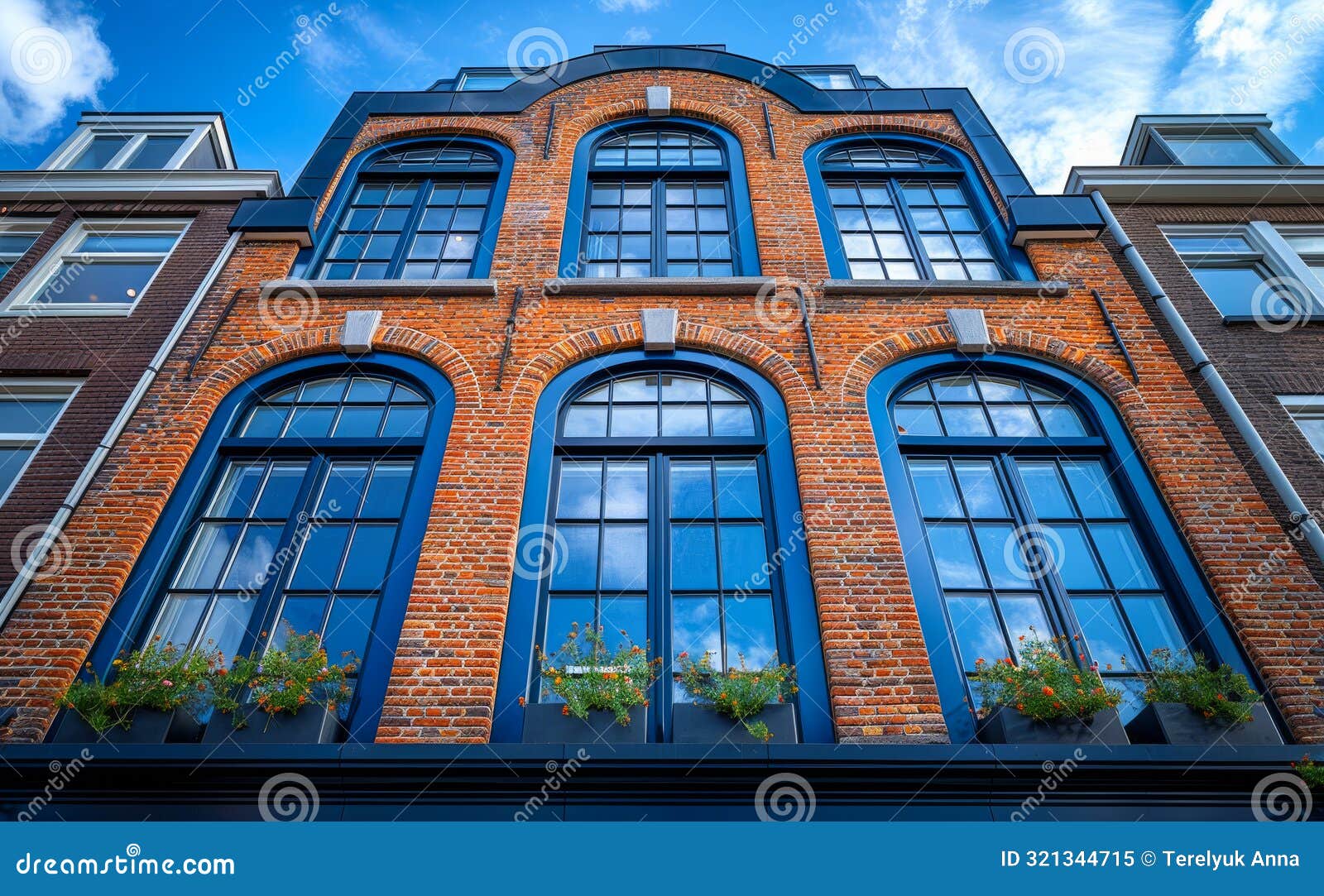 Facade of Typical Dutch House with Blue Windows and Red Bricks in ...