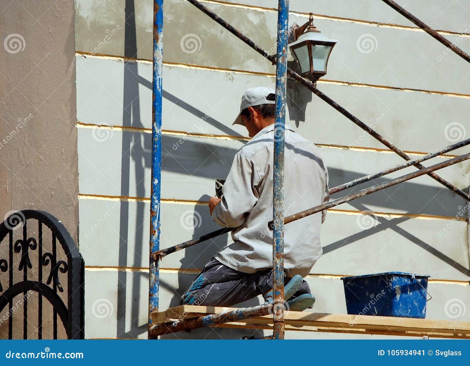 Worker Plastering House Walls, Finishing Walls. Wall Screeding ...