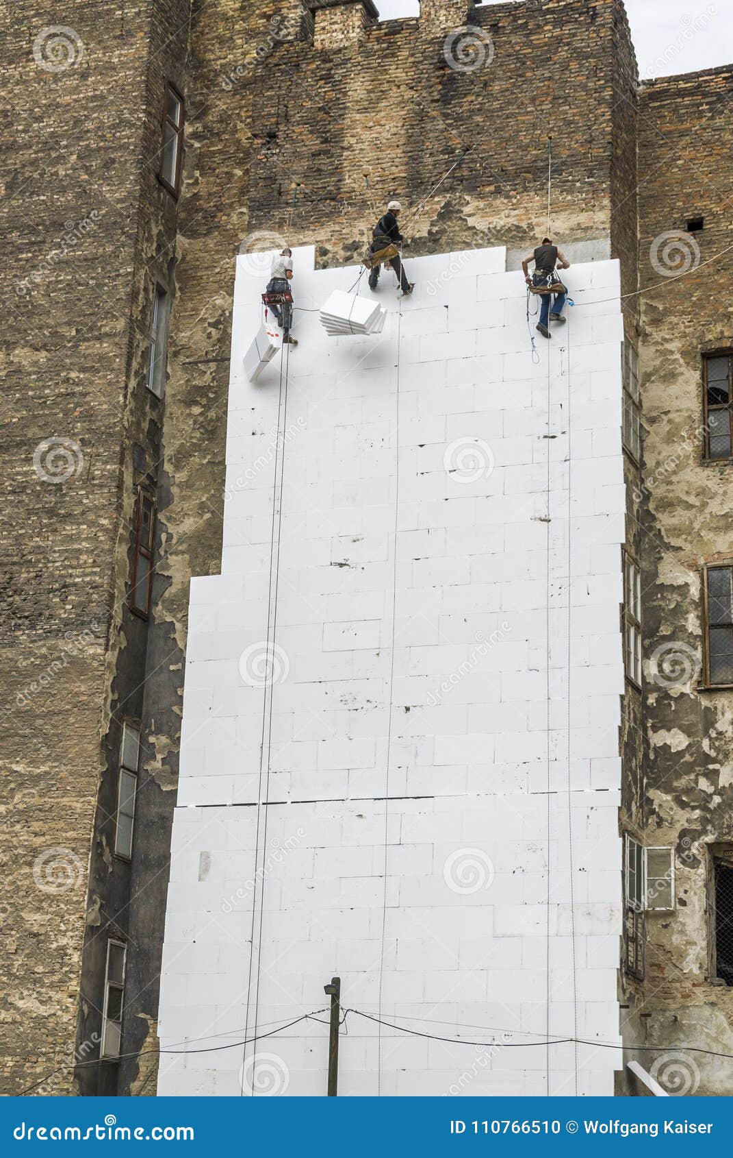 Facade Workers Mounting Polystyrene Insulation Editorial Image - Image ...