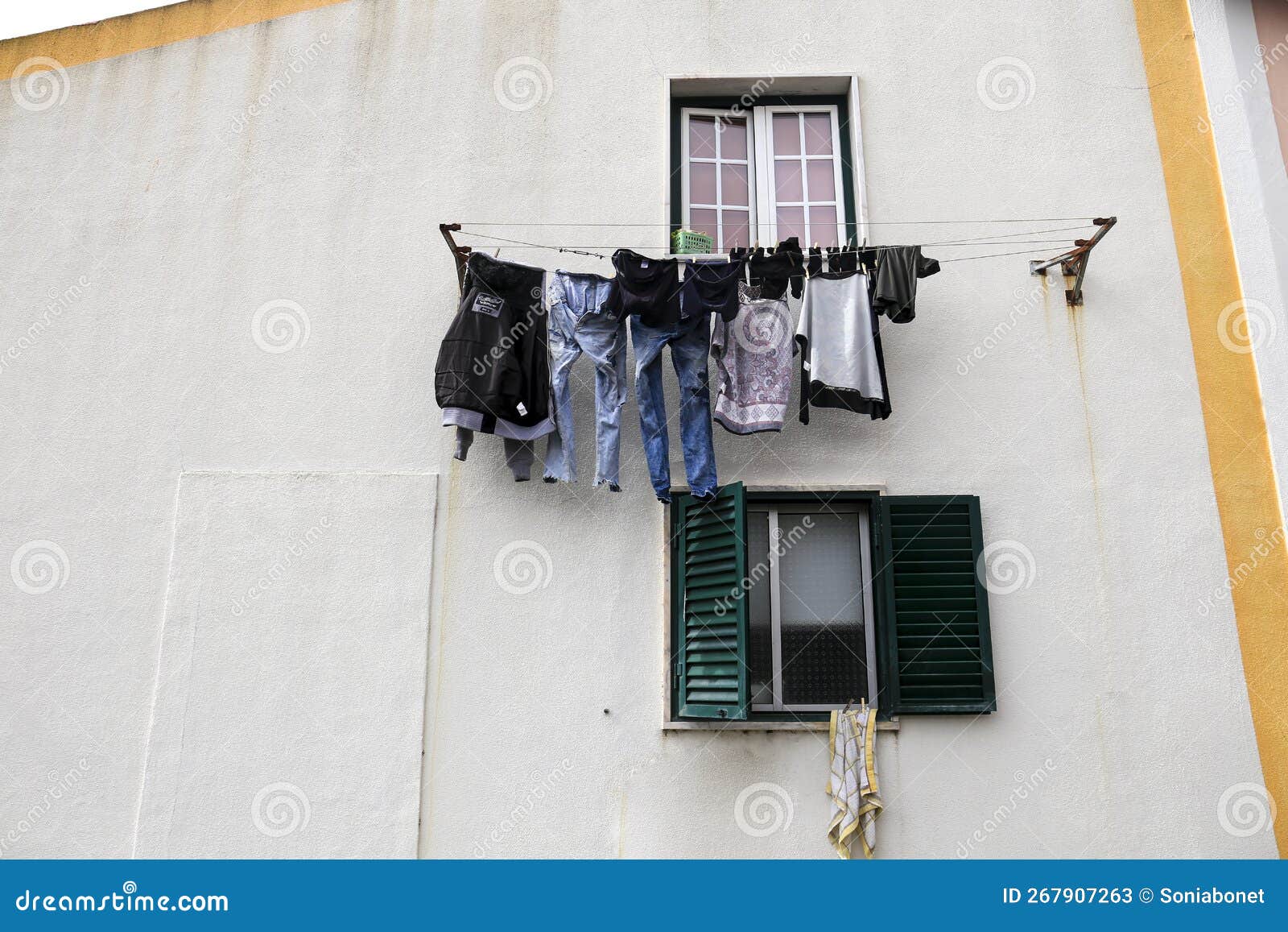 Facades and Balconies with Hanging Clothes in Lisbon Editorial Stock ...