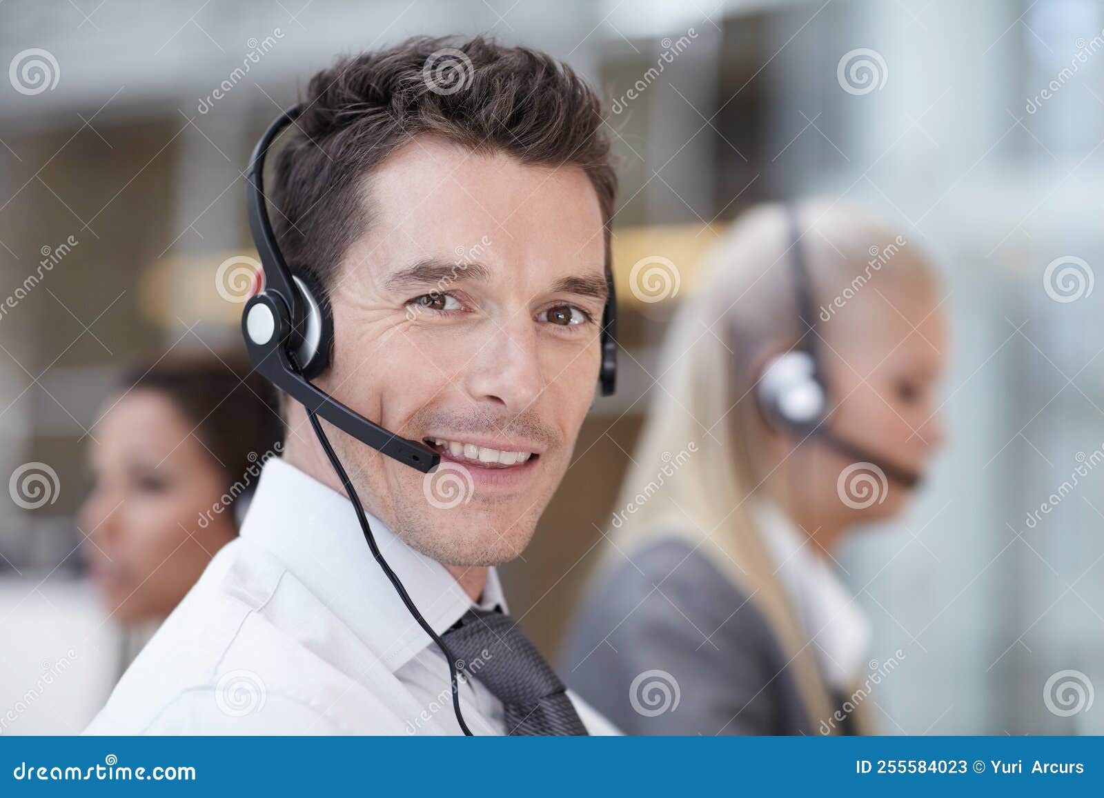 The Face of Efficiency. a Handsome Customer Service Representative ...