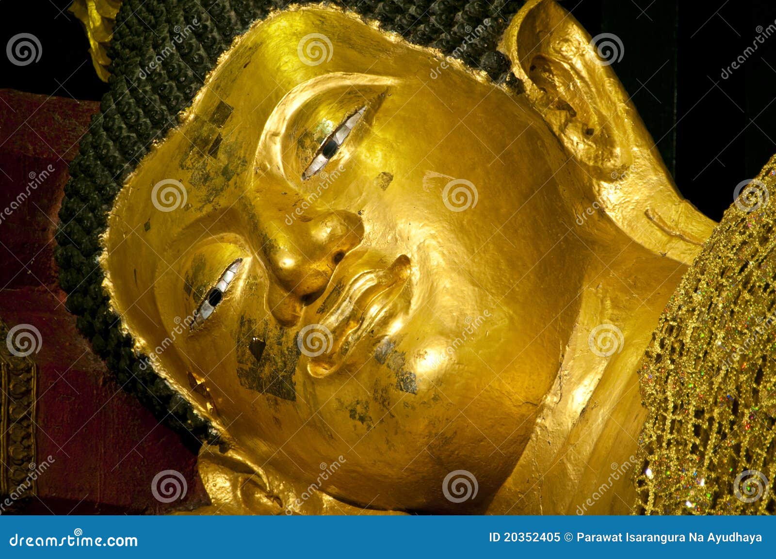 The Face of Golden Buddha in Sleeping Posture Stock Image - Image of ...
