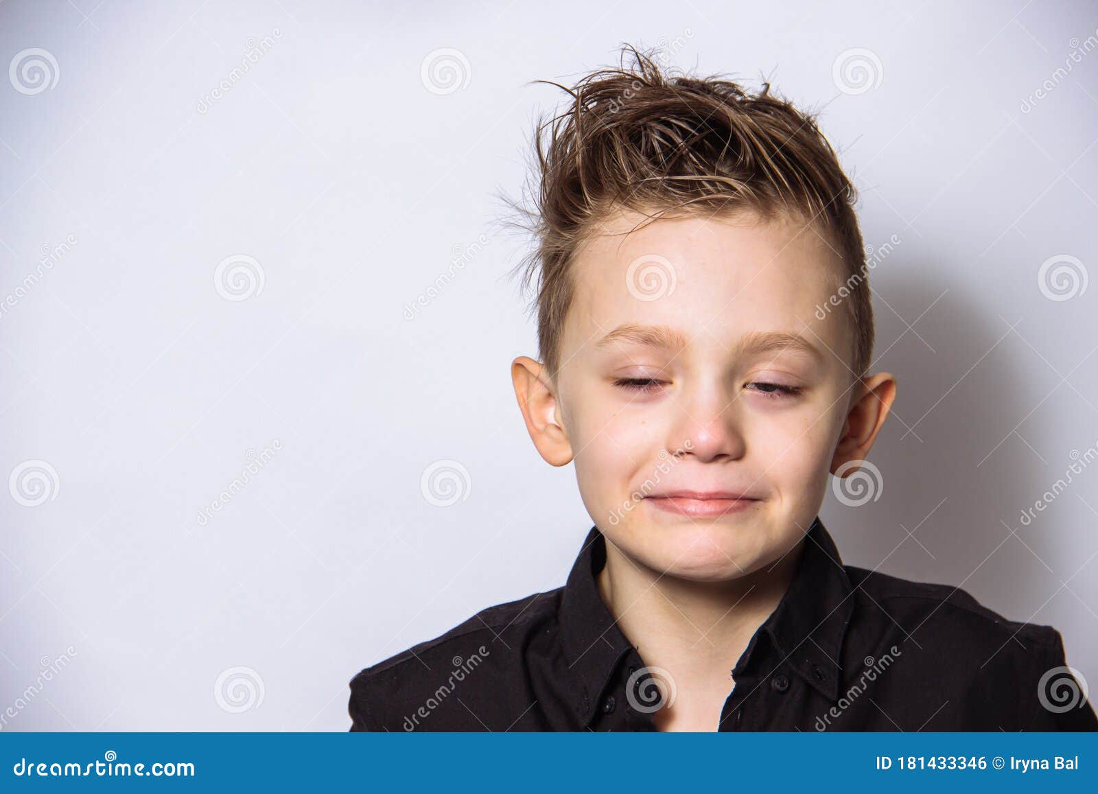 Face of a Guy with a Sad Expression on a White Background, Close-up ...
