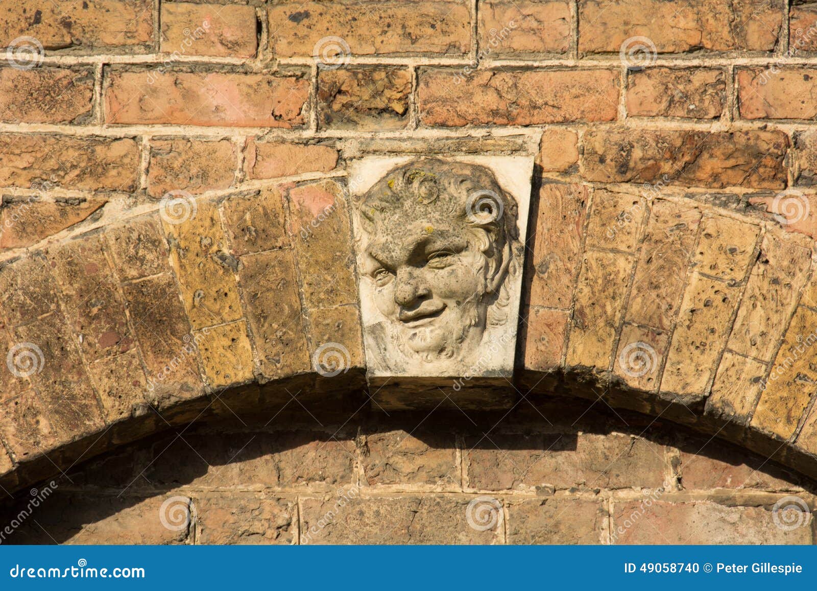 Face on key stone stock photo. Image of photostock, architecture - 49058740