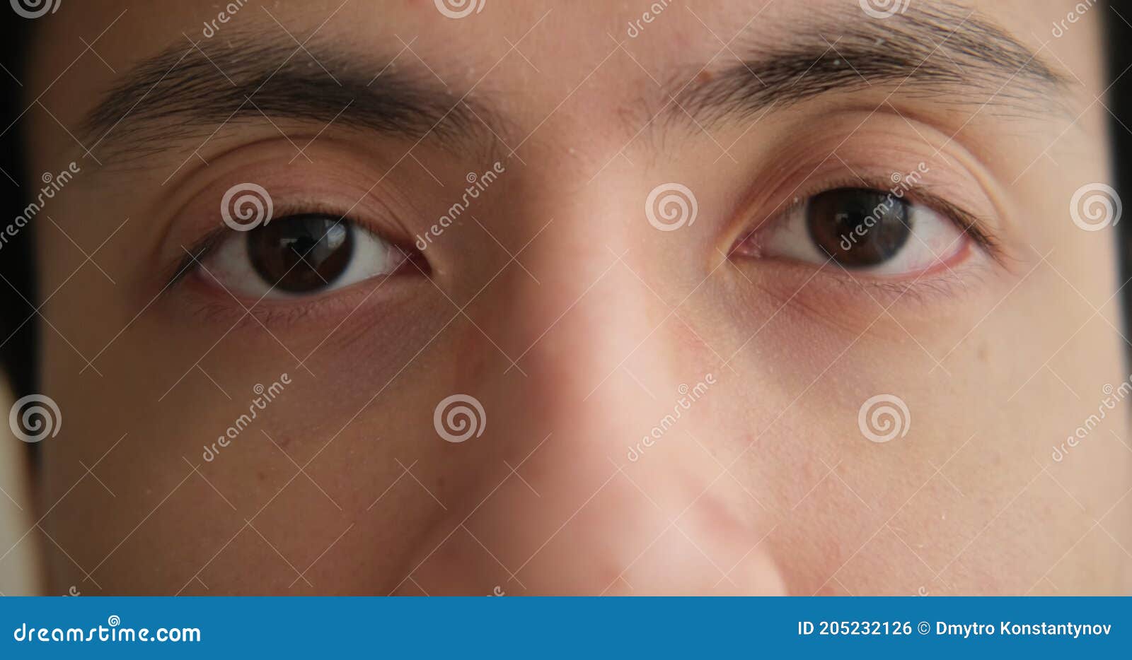Face of man blinking eyes stock footage. Video of skin - 205232126