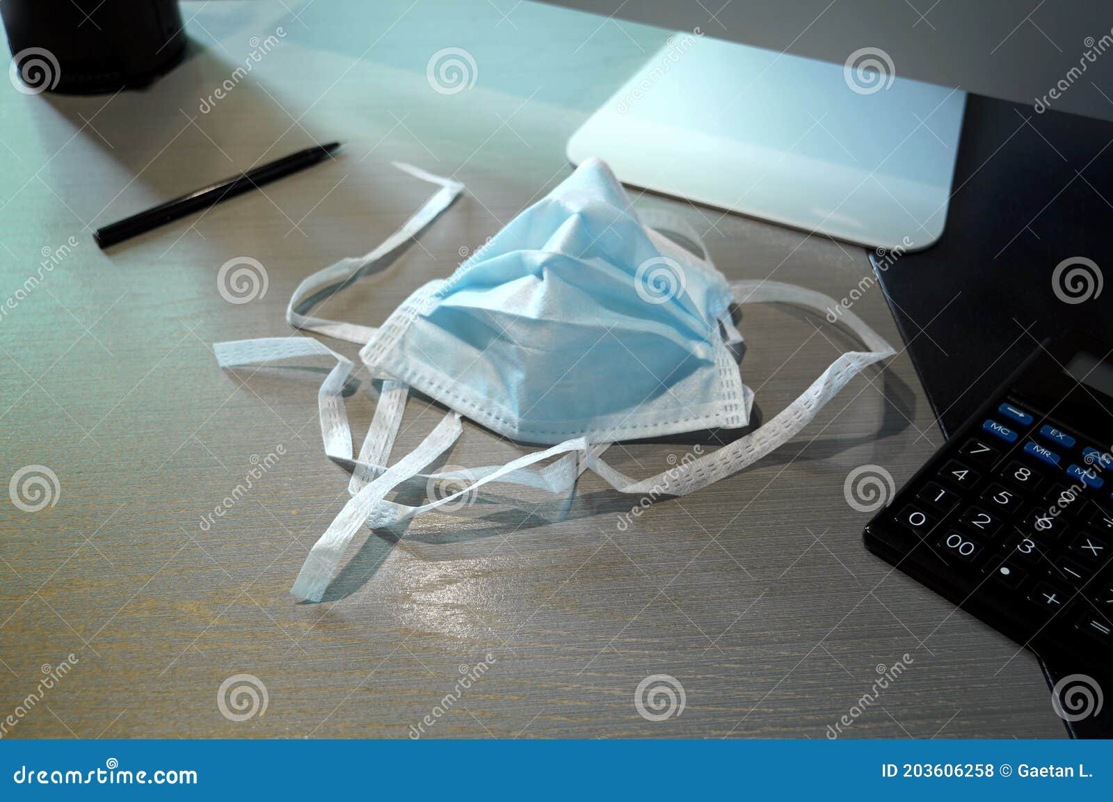 Face mask on desk stock photo. Image of covid, health - 203606258