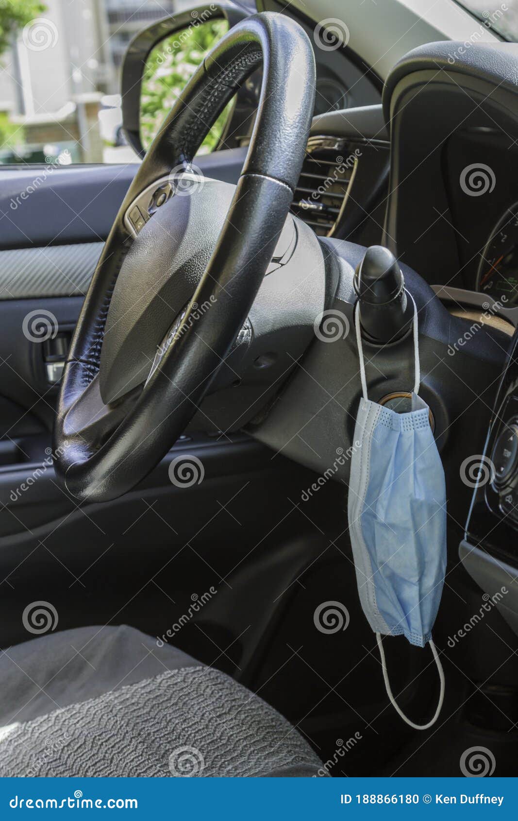 A Face Mask Hanging in a Car Stock Photo - Image of concept, interior ...