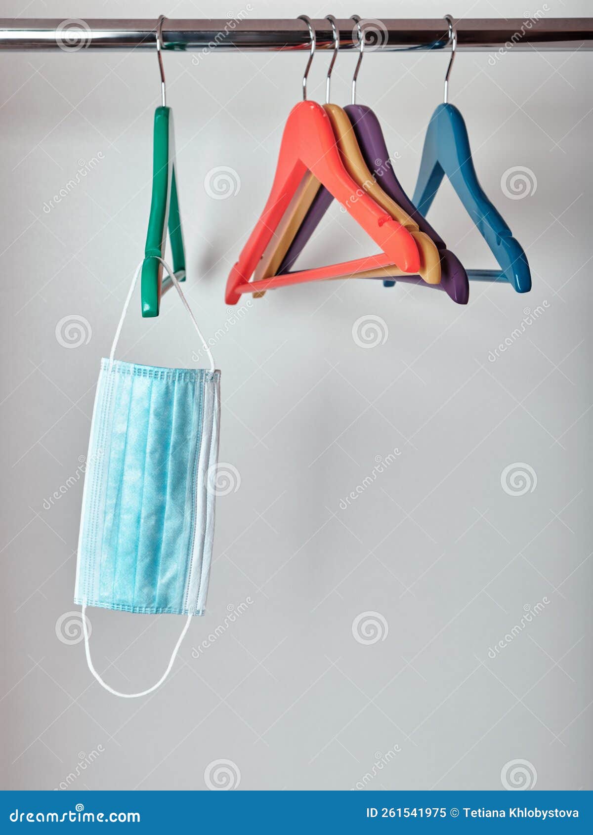 Face Mask Hangs in Wardrobe Along with Other Empty Hangers Stock Image ...