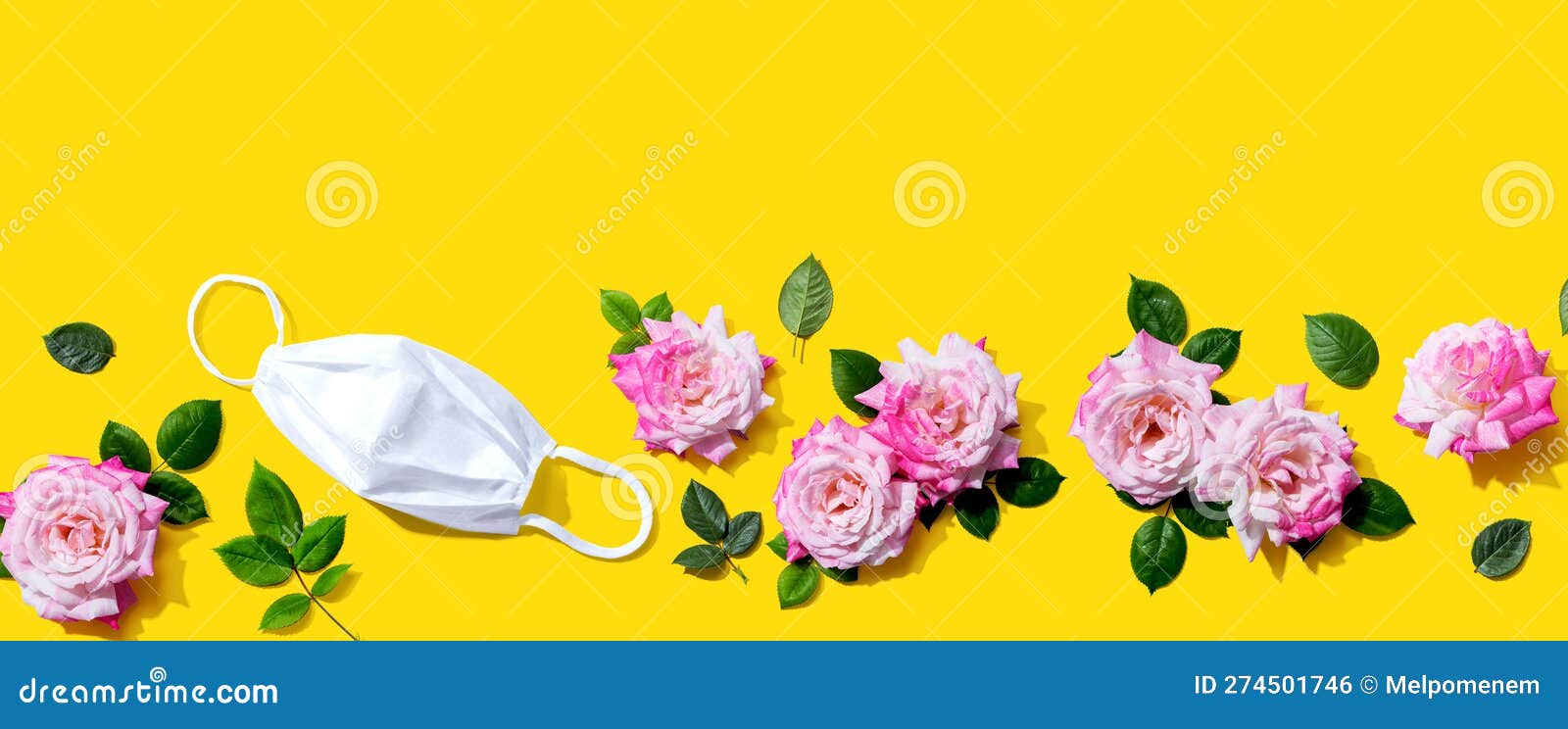Face Mask with Pink Roses Overhead View Stock Photo - Image of remote ...