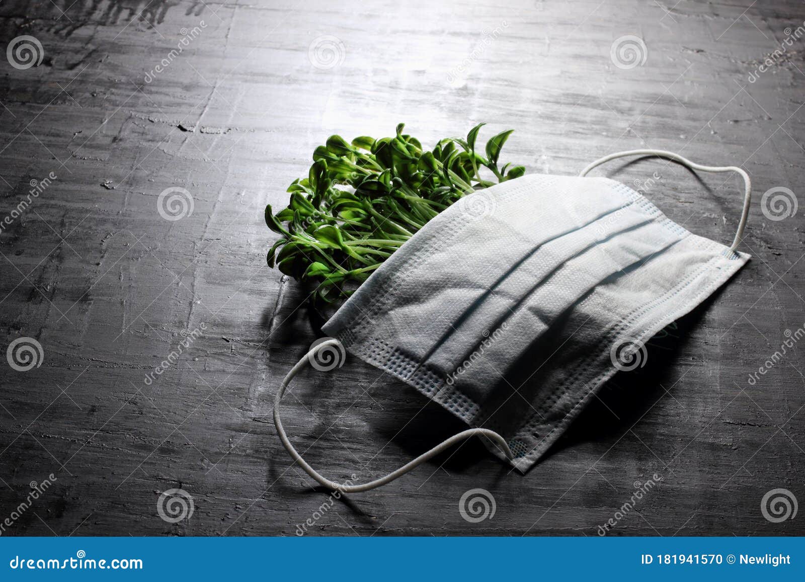 Face mask and Young Plants stock photo. Image of mask - 181941570