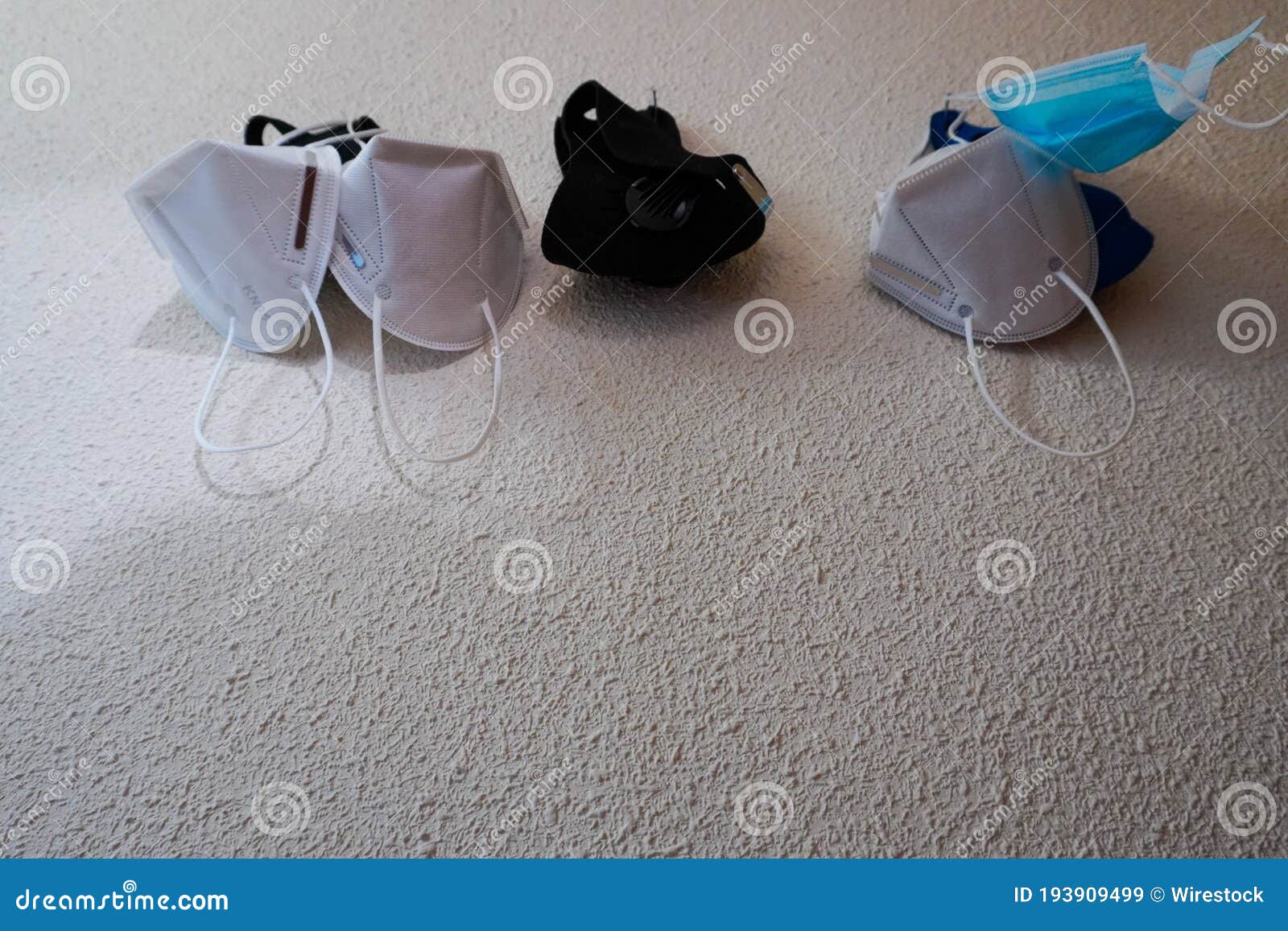 Face Masks Hanging on a Hook - the New Normal Concept Stock Image ...