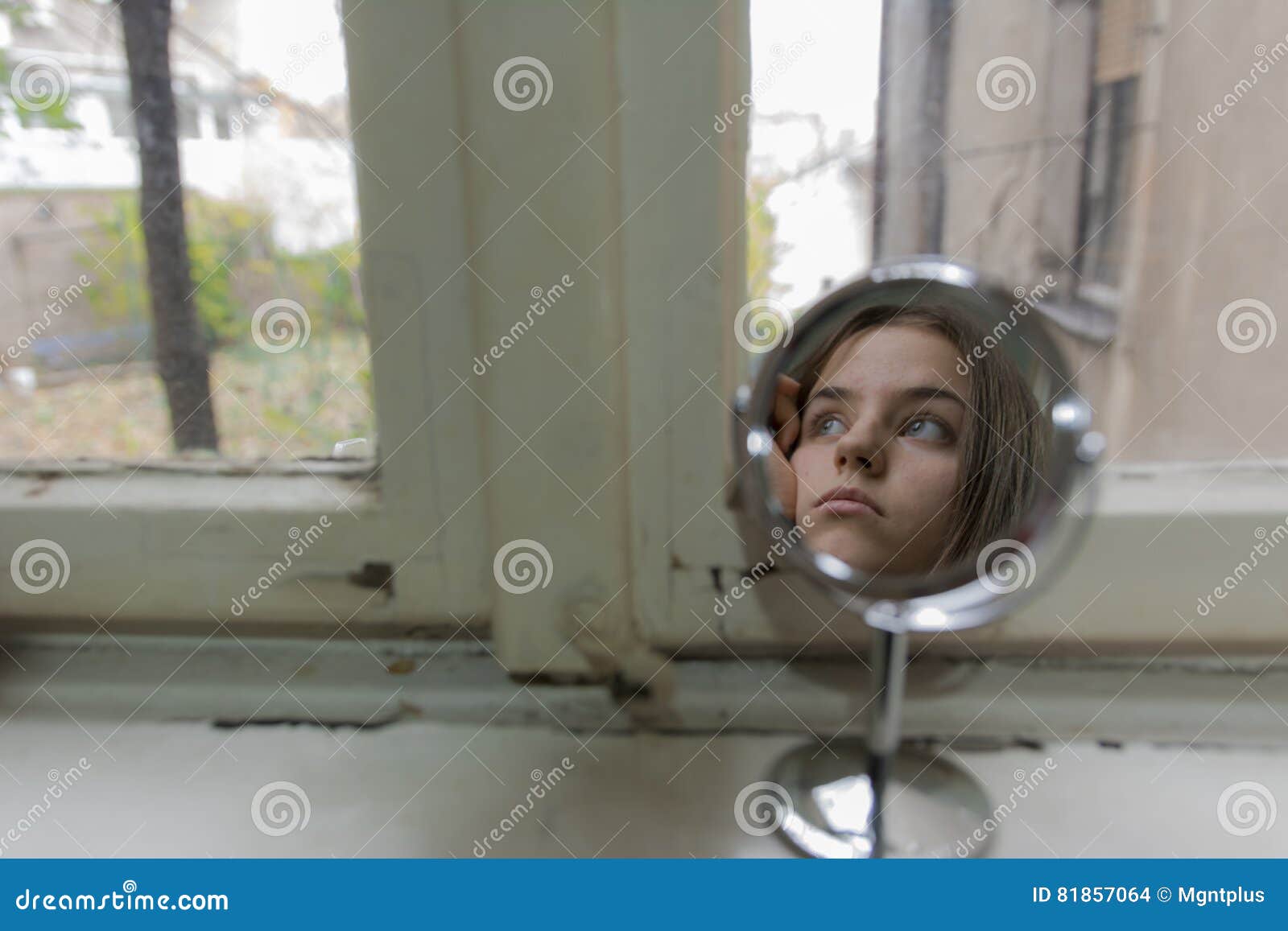 Face in the mirror stock photo. Image of reflection, looks - 81857064