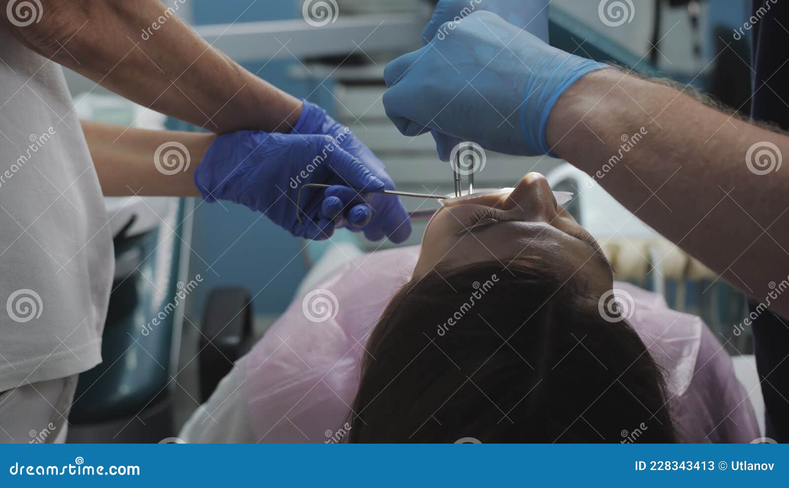 Face of Patient, Hands of Dentist Sutured Wound after Tooth Extraction ...