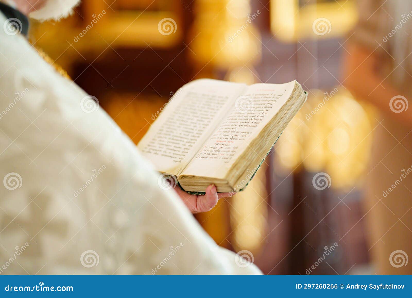 A Prayer Book in the Hands of a Priest at a Ceremony in a Church. Stock ...