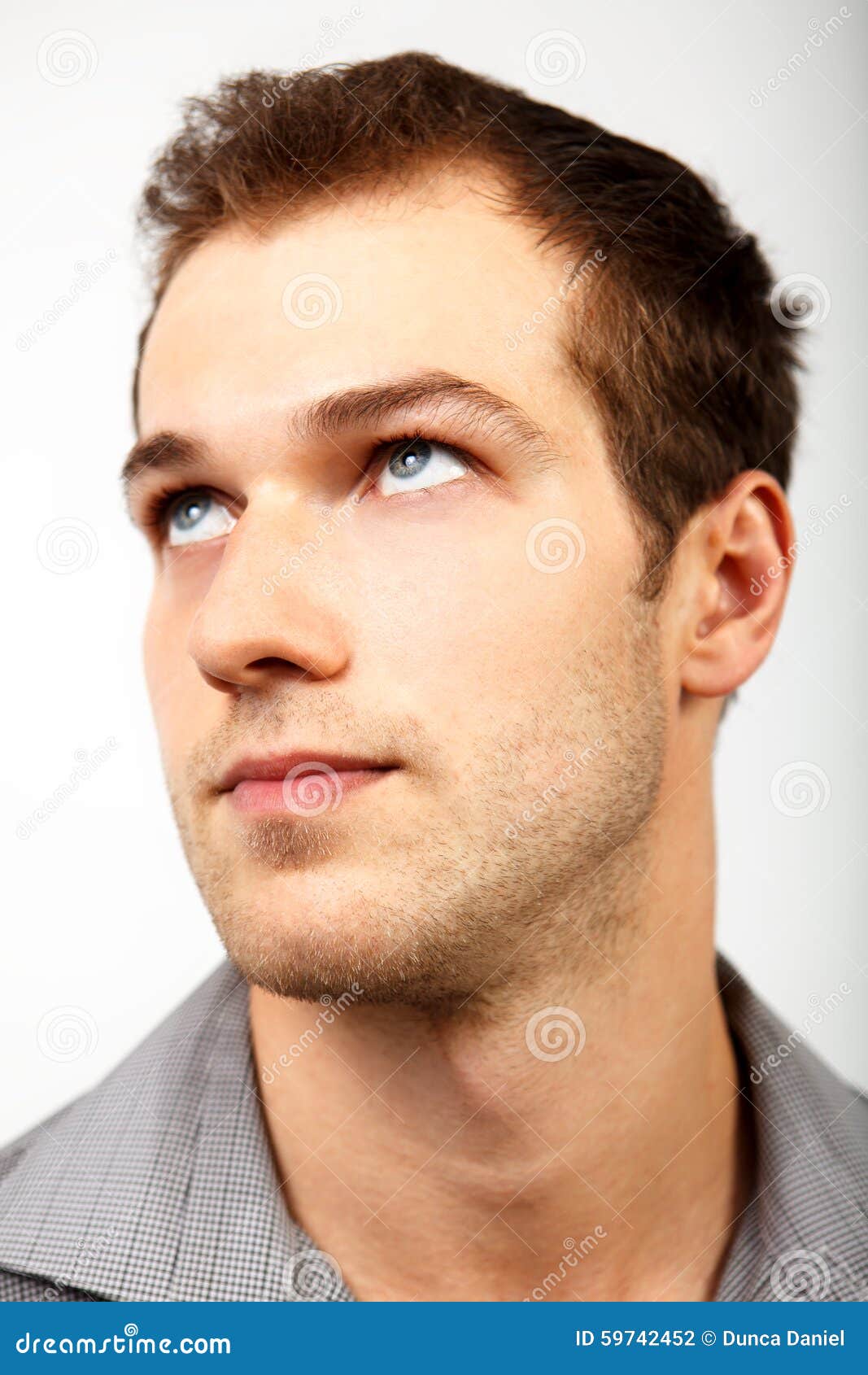 Face of Serious Man Looking Up Stock Photo - Image of closeup, studio ...