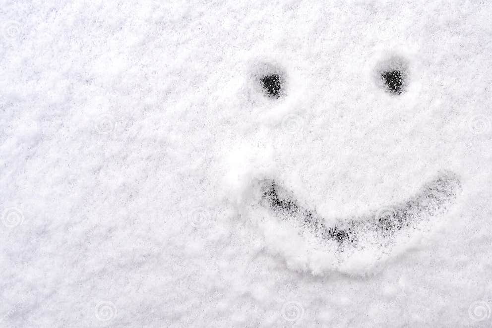 A Face with a Smile is Drawn on White Snow in Winter Stock Photo ...