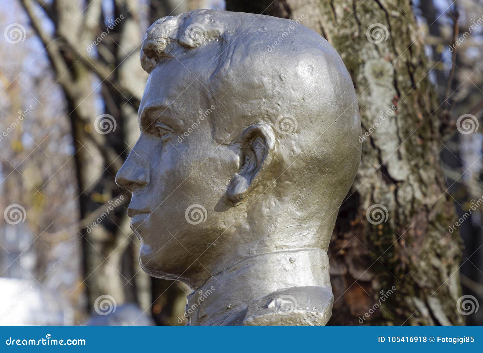 The Face of the Stone Man. Concrete Soldier Bust Covered with Pa Stock ...